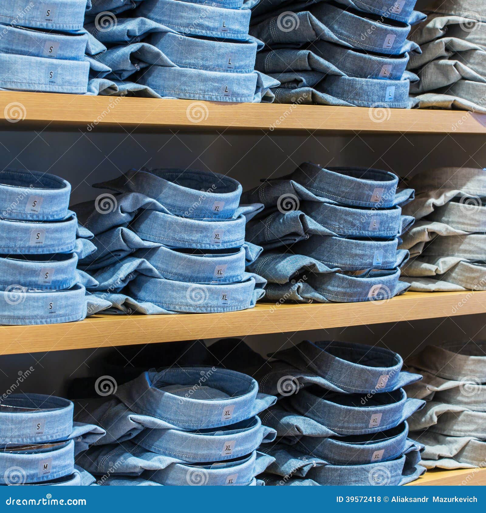 Neat Stacks of Folded Clothing Stock Photo - Image of colourful, choice ...