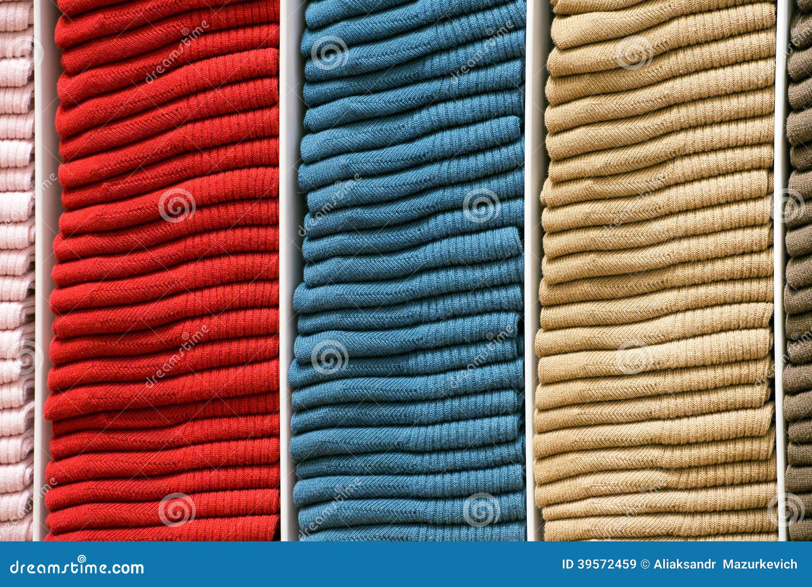 Neat Stacks of Folded Clothing Stock Image - Image of fabric, buying ...
