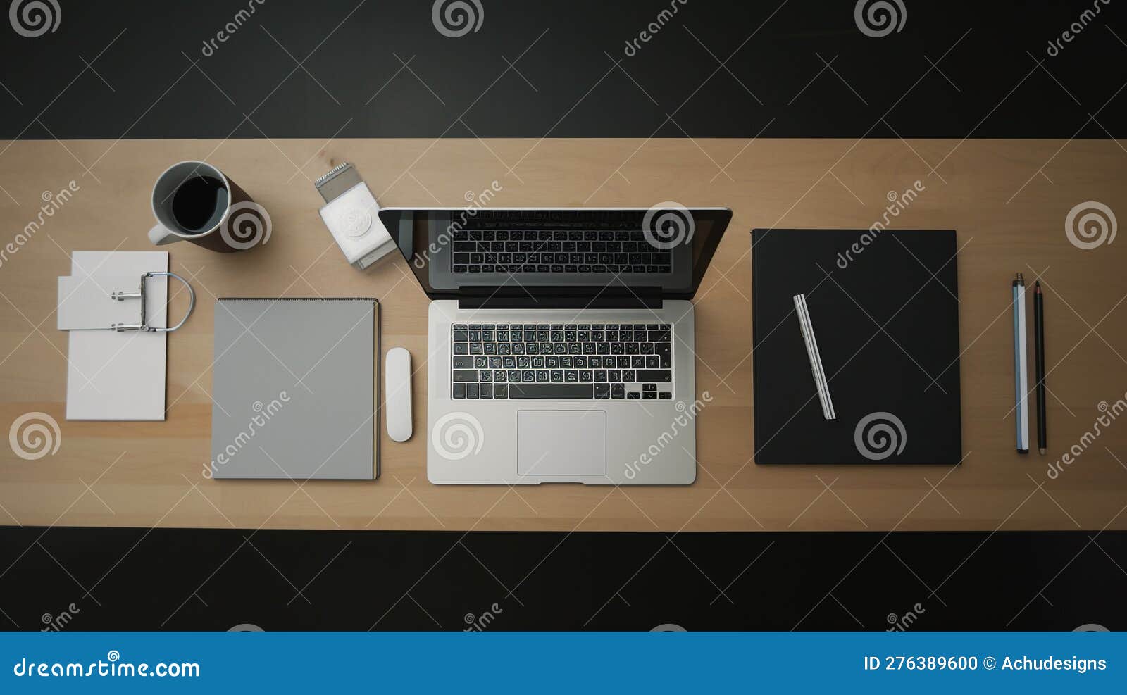 A Neatly Arranged Desk with a Laptop, Notebook, and Pen Stock ...
