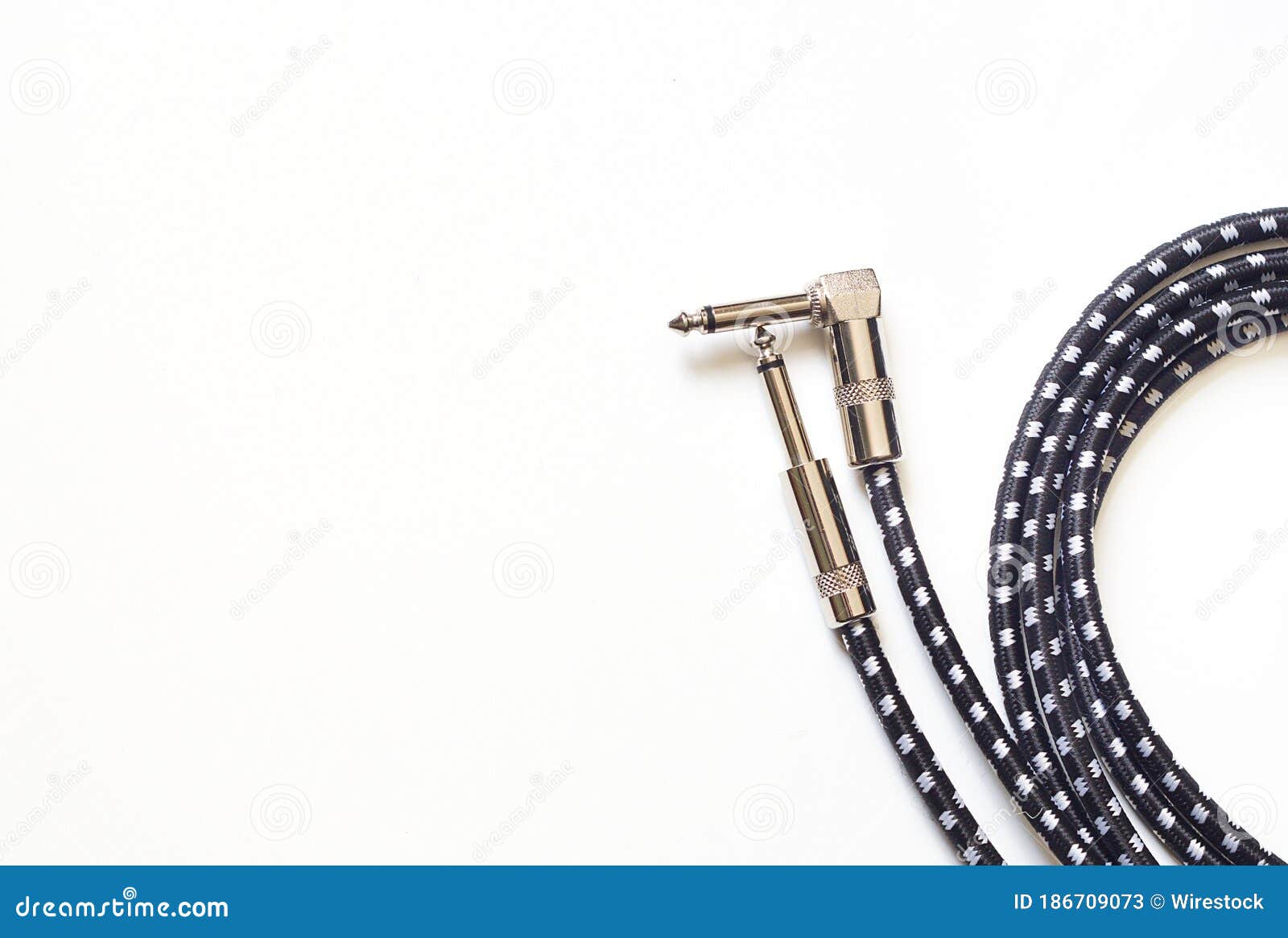 Neatly Coiled Guitar Cable and Quarter-inch Right Stock Image - Image ...