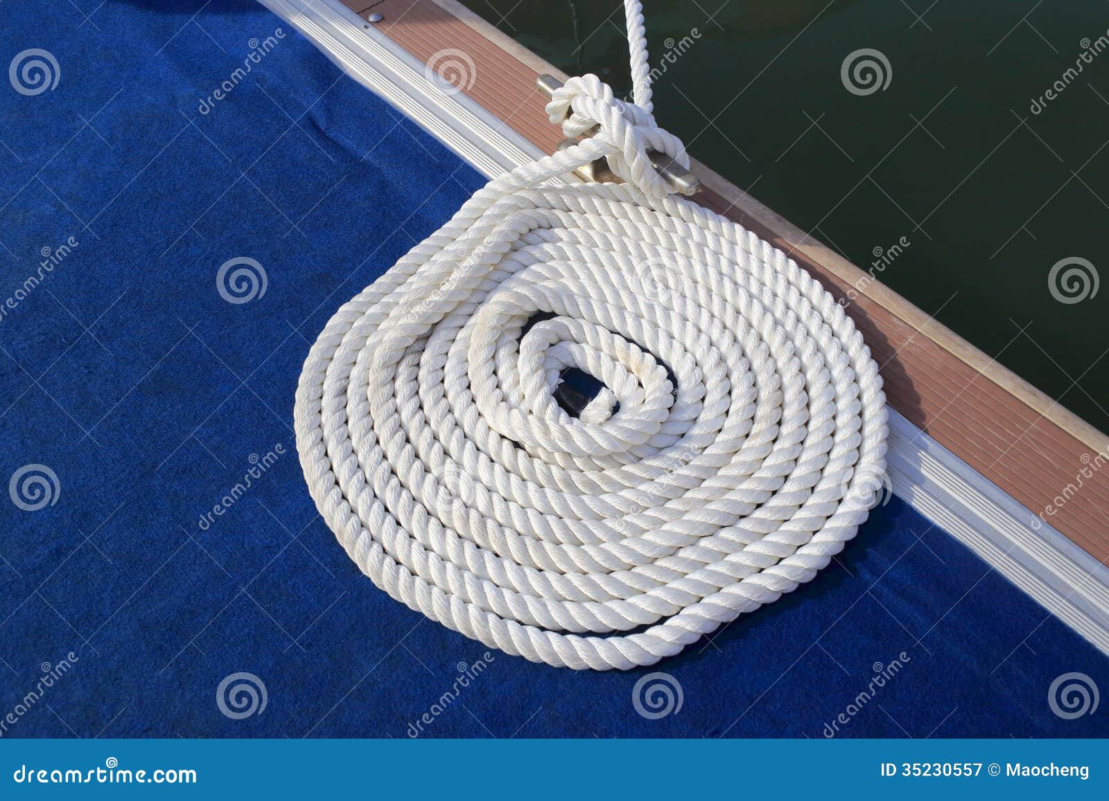 Neatly coiled nylon rope stock image. Image of coil, boating - 35230557