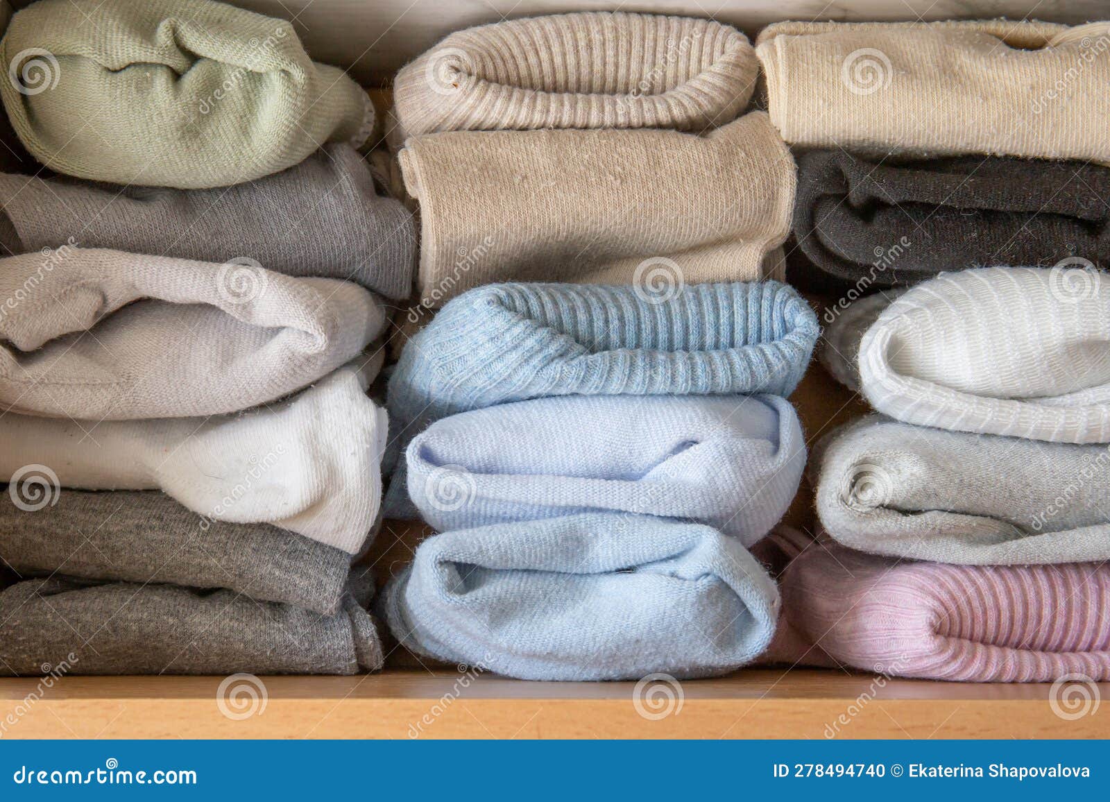 Neatly Folded Socks, Sorted into Pairs, Lie in Rows in a Drawer. Stock ...