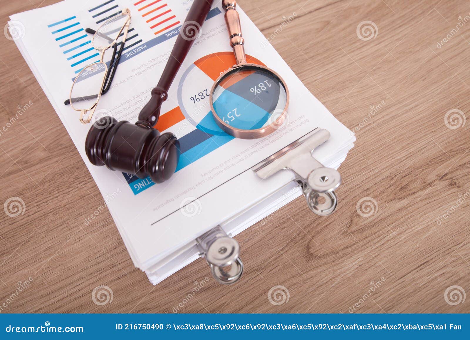 Neatly Stacked Stack of Business Documents, Magnifying Glass and Hammer ...