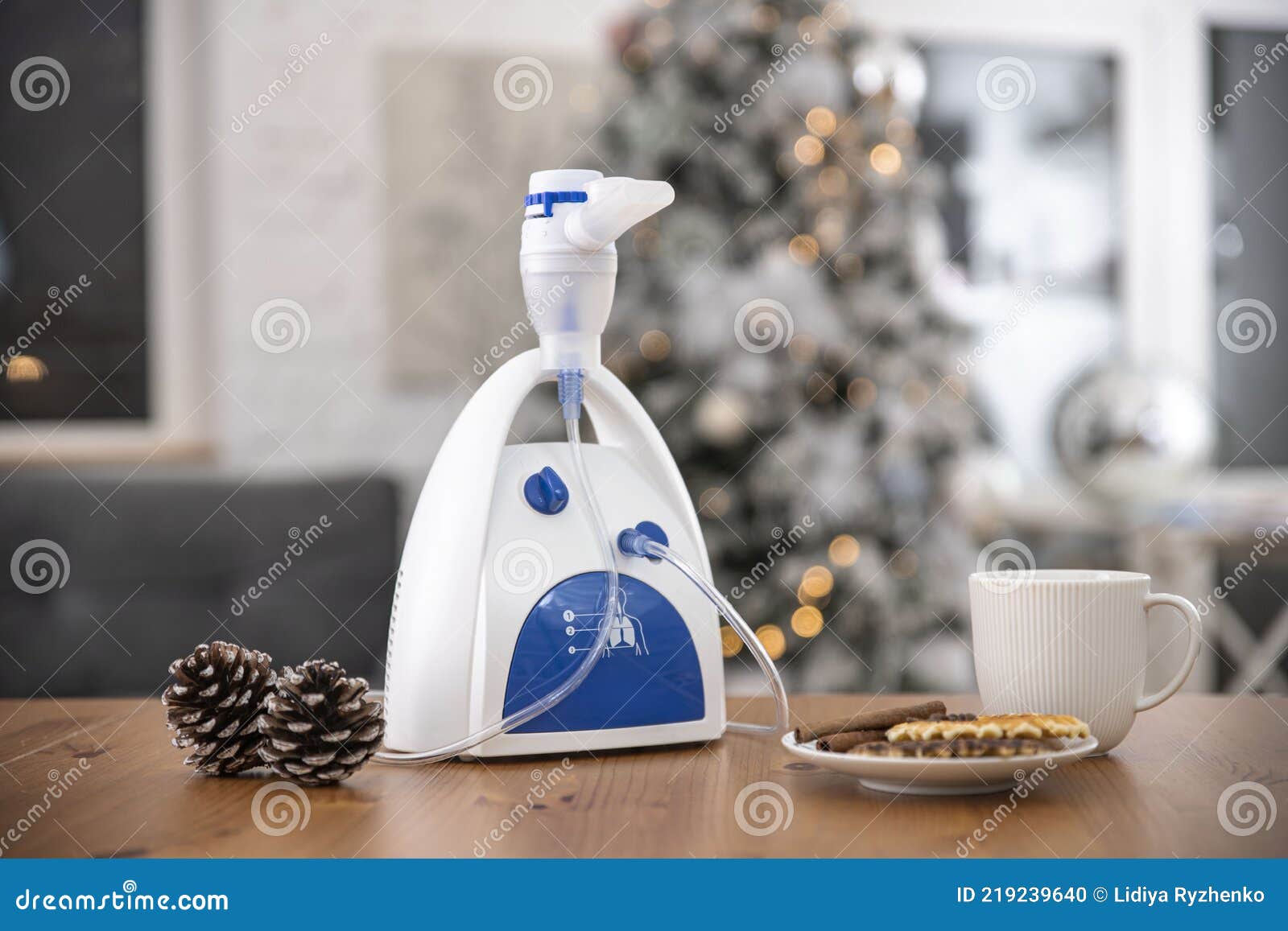 Nebulizer on the Table with a Cup and Fir Cones in the Room Stock Photo ...