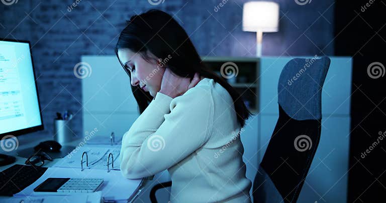 Neck Pain while Working at Computer Stock Photo - Image of night ...