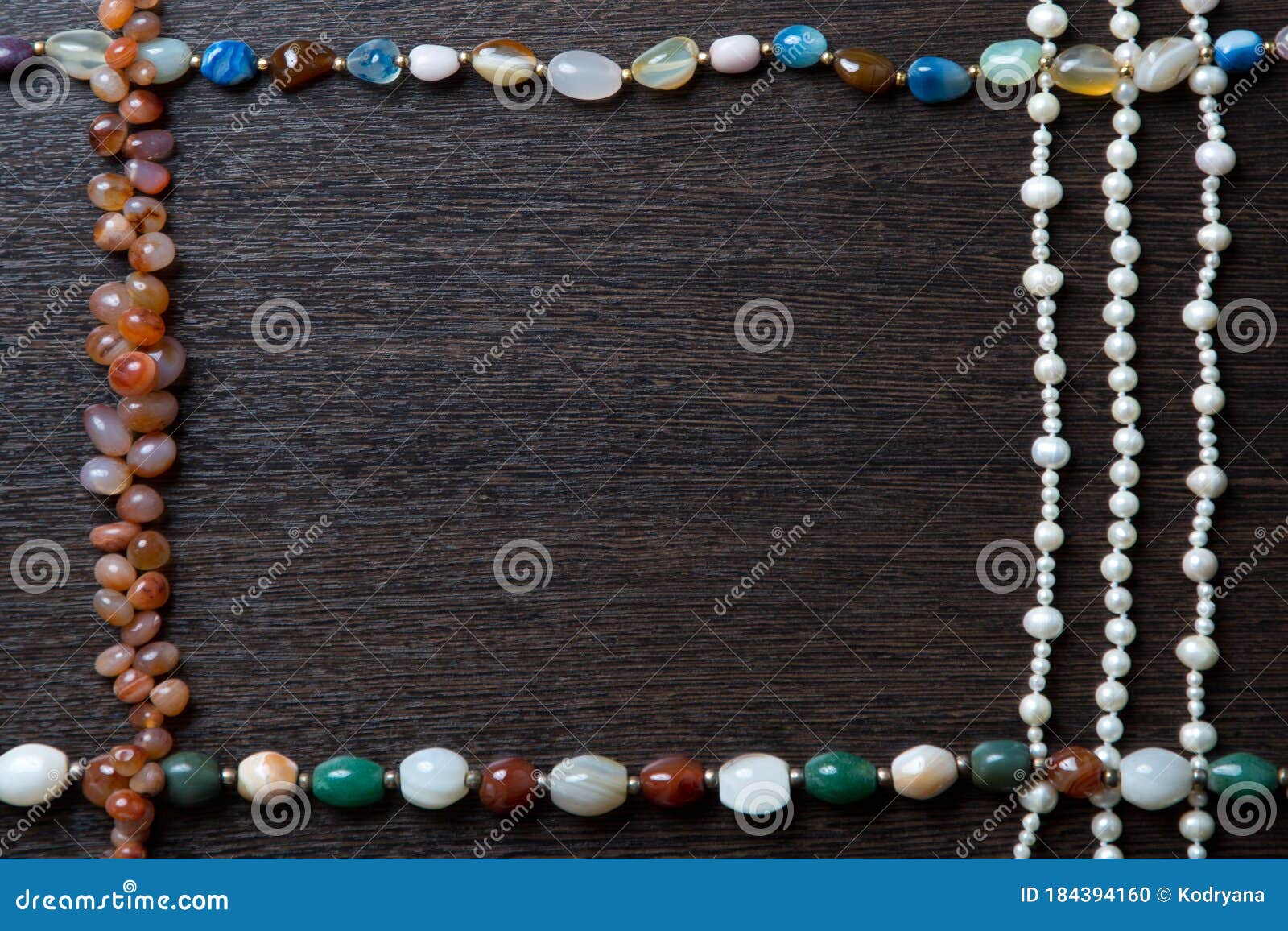 Necklaces on a Wooden Table Stock Photo - Image of gift, pearl: 184394160
