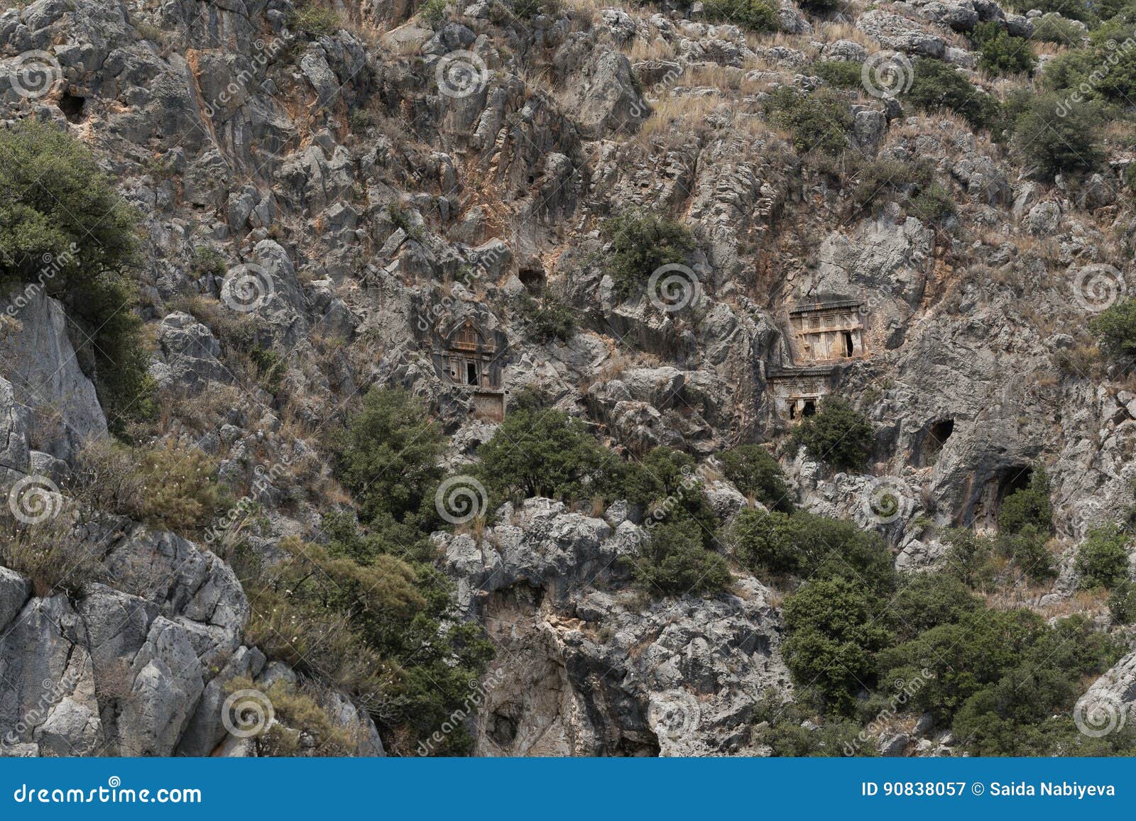 Necropolis Carved in Vertical Faces of Cliffs in Lycian Myra in Turkey ...