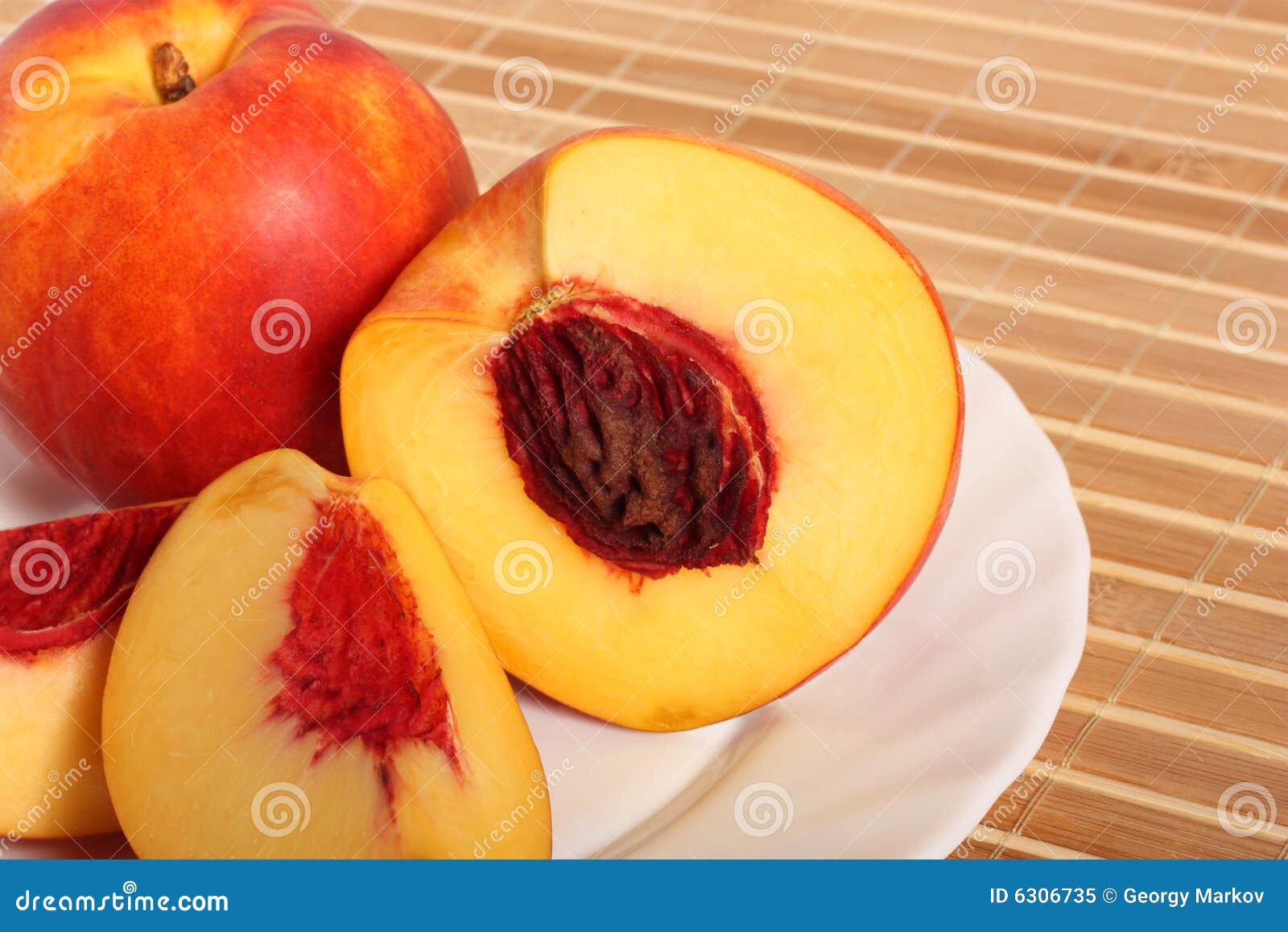 Nectarine fruit on plate stock image. Image of quarter - 6306735