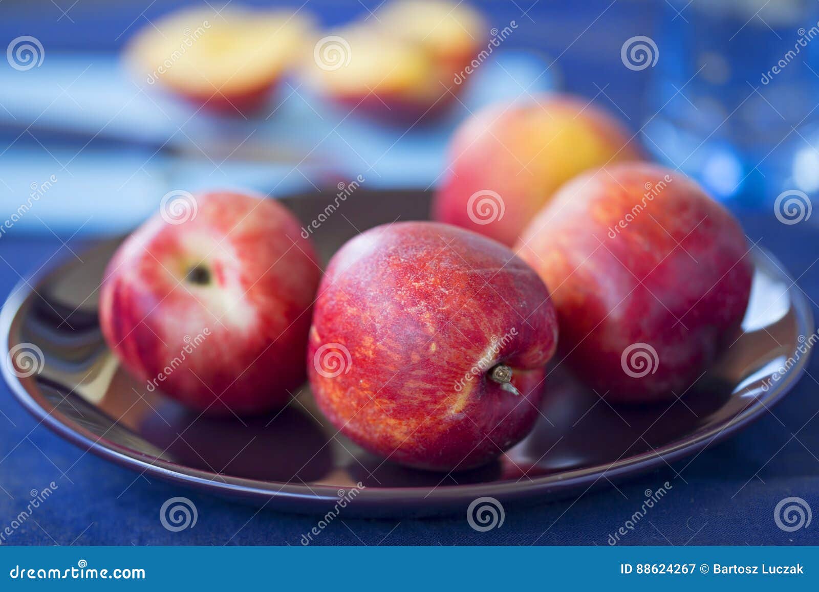 Nectarines on plate stock image. Image of juicy, five - 88624267