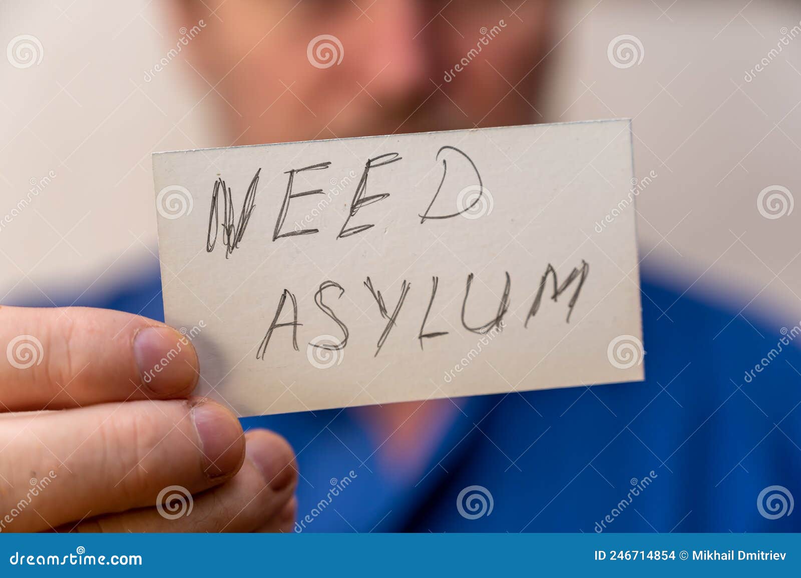 Need Asylum. the Writing is in Jagged Gray Letters on the Paper Stock ...