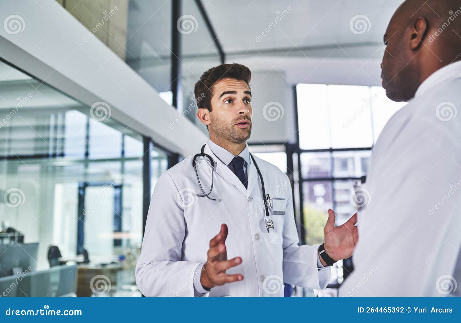 We Need To Make Quick Decisions on this One. Two Doctors Having a ...