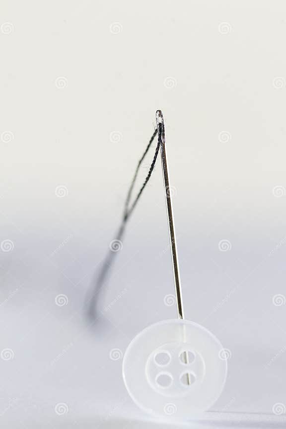 Needle, button and string stock photo. Image of blue - 44347092