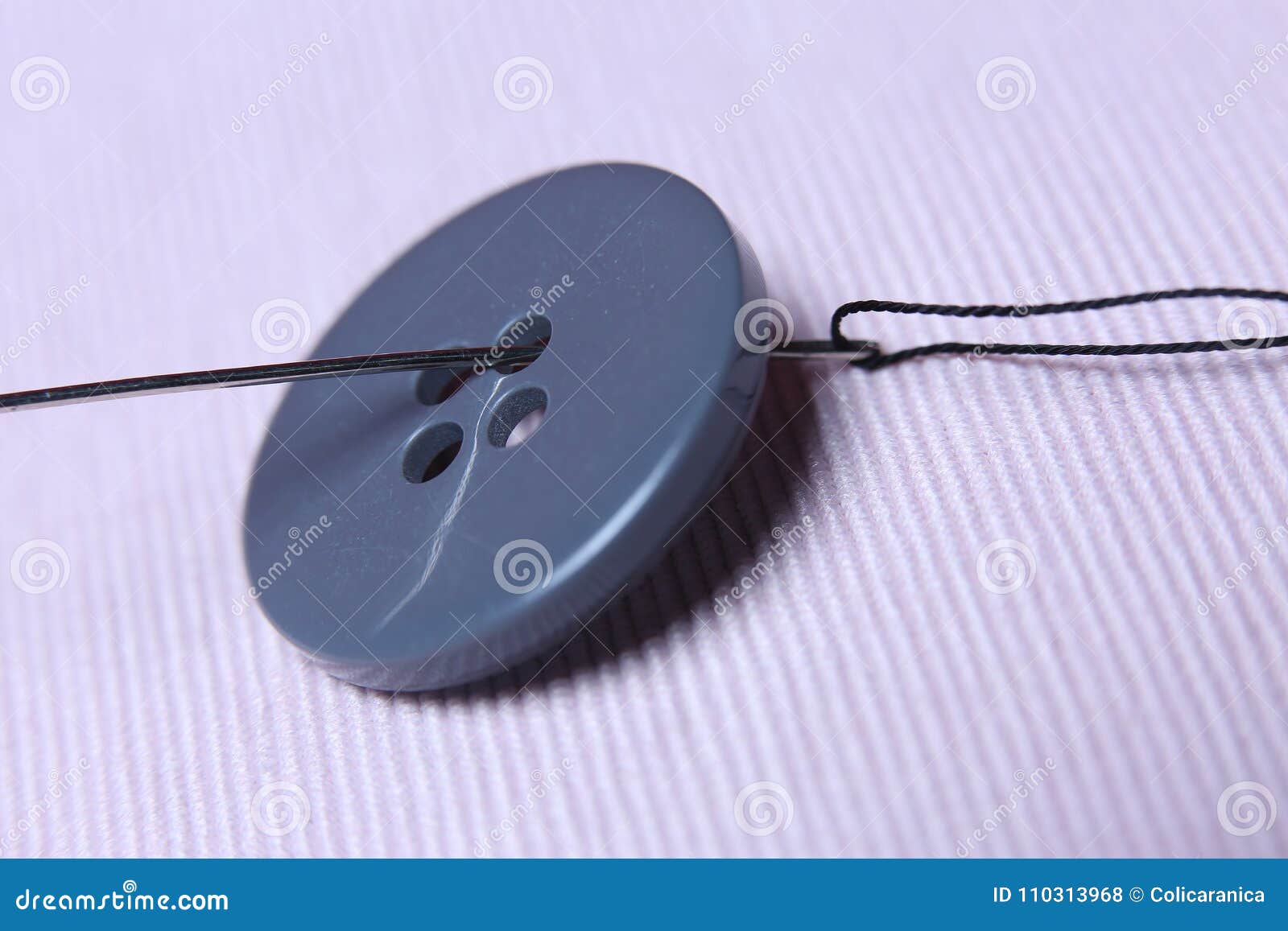 Needle in Button, White Background Stock Photo - Image of sewing, craft ...