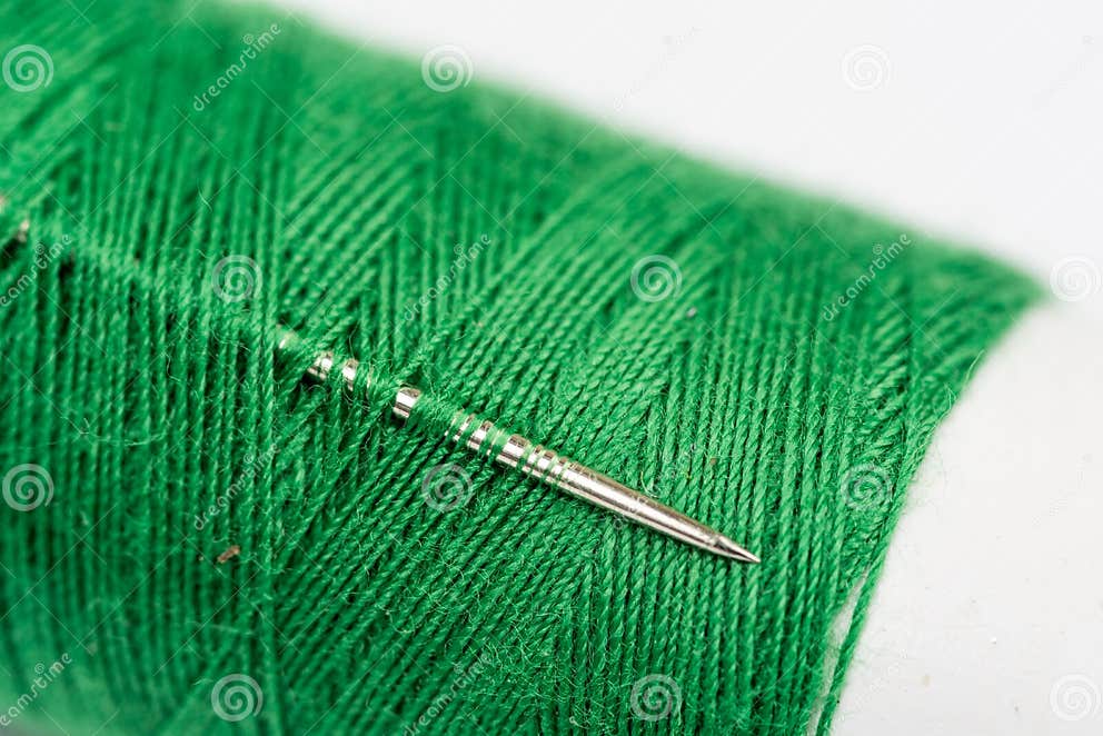 Needle Head on the Green Thread Over White Background Stock Photo ...