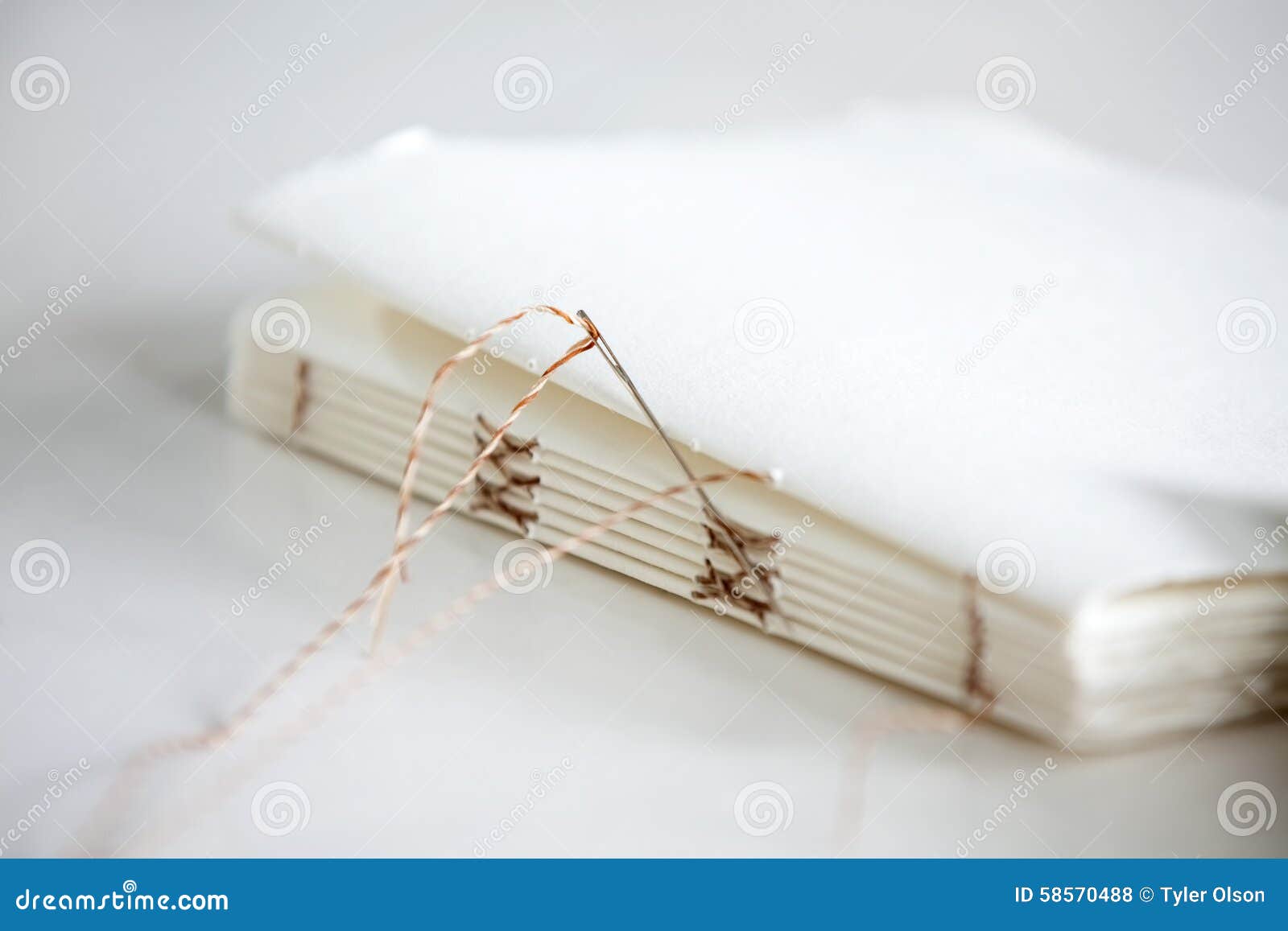 Needle and Notepad Papers on Table Stock Photo - Image of material ...