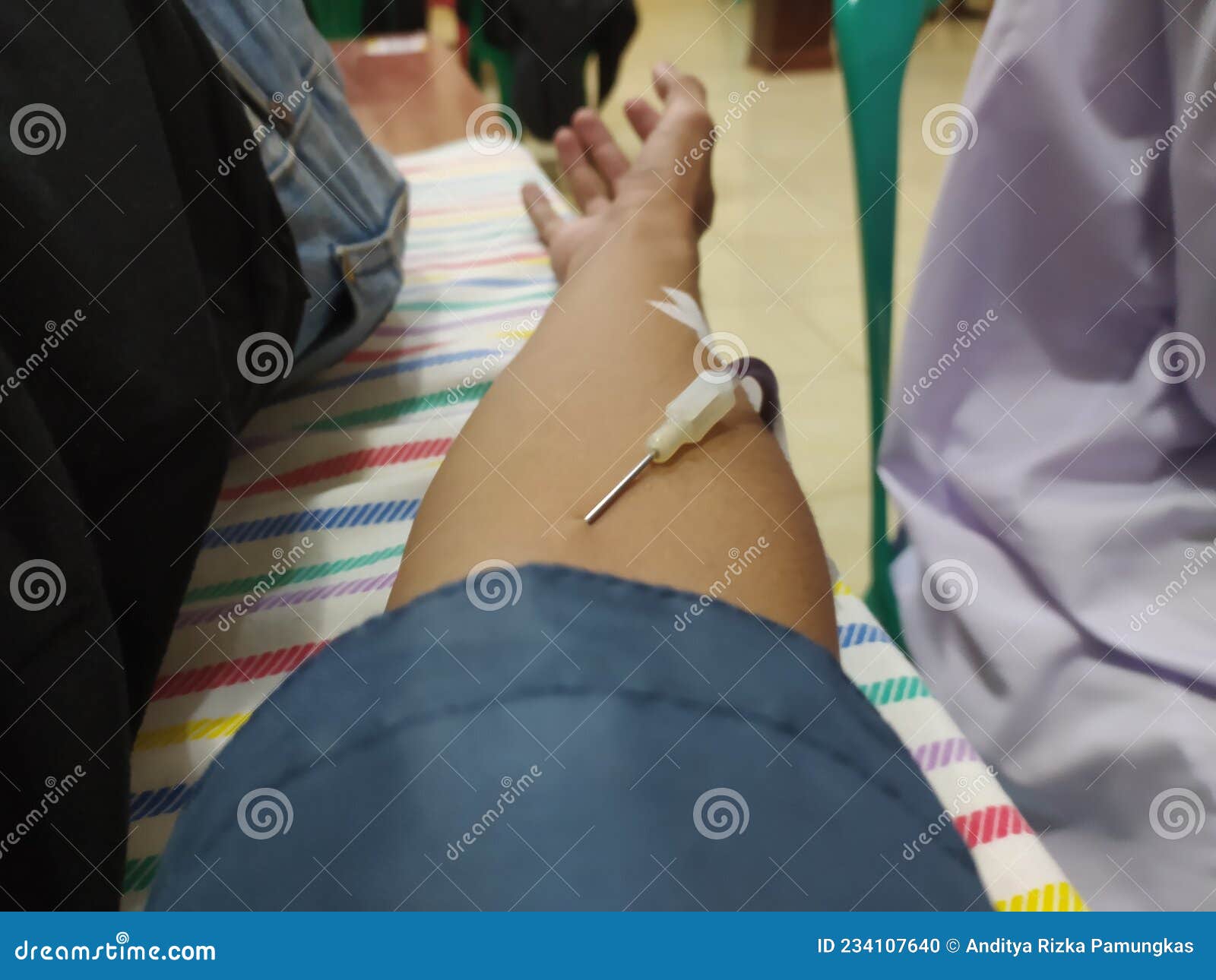 A Needle Pierced His Hand for Blood Transfusion Stock Photo - Image of ...