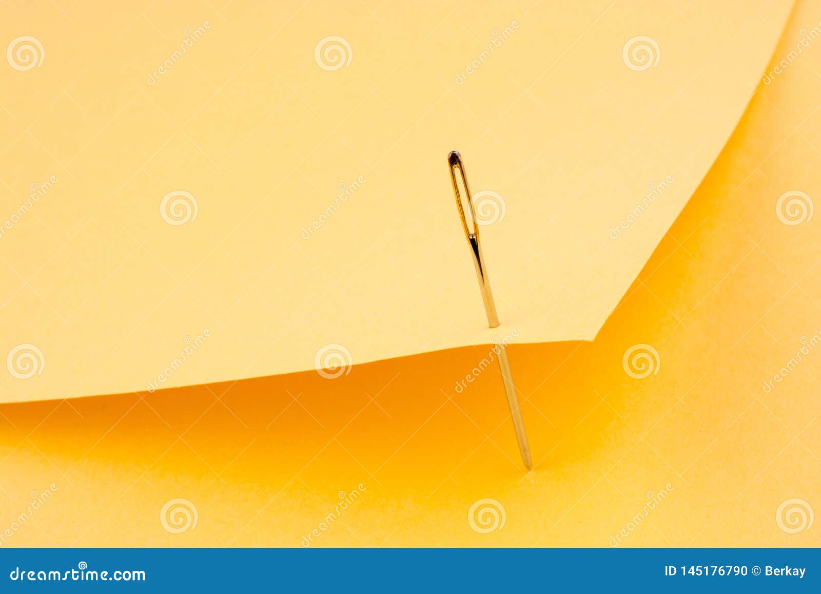 Needle Pierced Yellow Note Paper Stock Photo - Image of hold, business ...