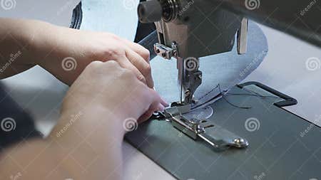 Needle of the Sewing Machine in Motion, Close-up. Needle of the Sewing ...