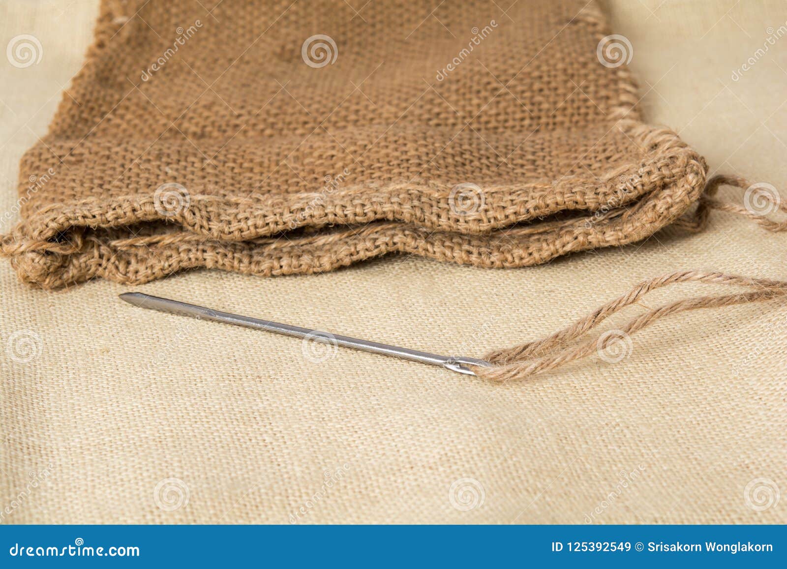 Needle and sewing rope stock image. Image of color, closeup - 125392549