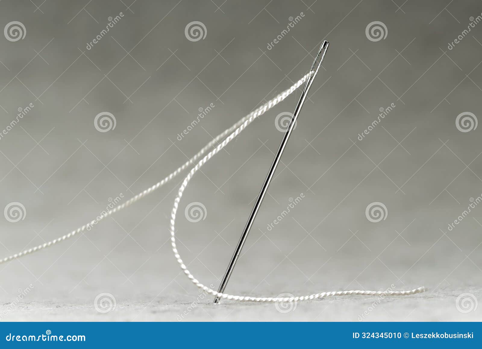Needle with Thread on Grey Background Stock Photo - Image of design ...