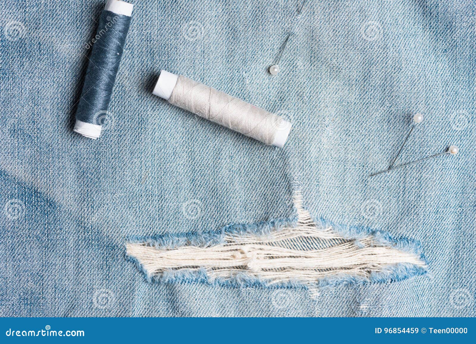 The Needle with a Thread through the Jean Stock Image - Image of rough ...