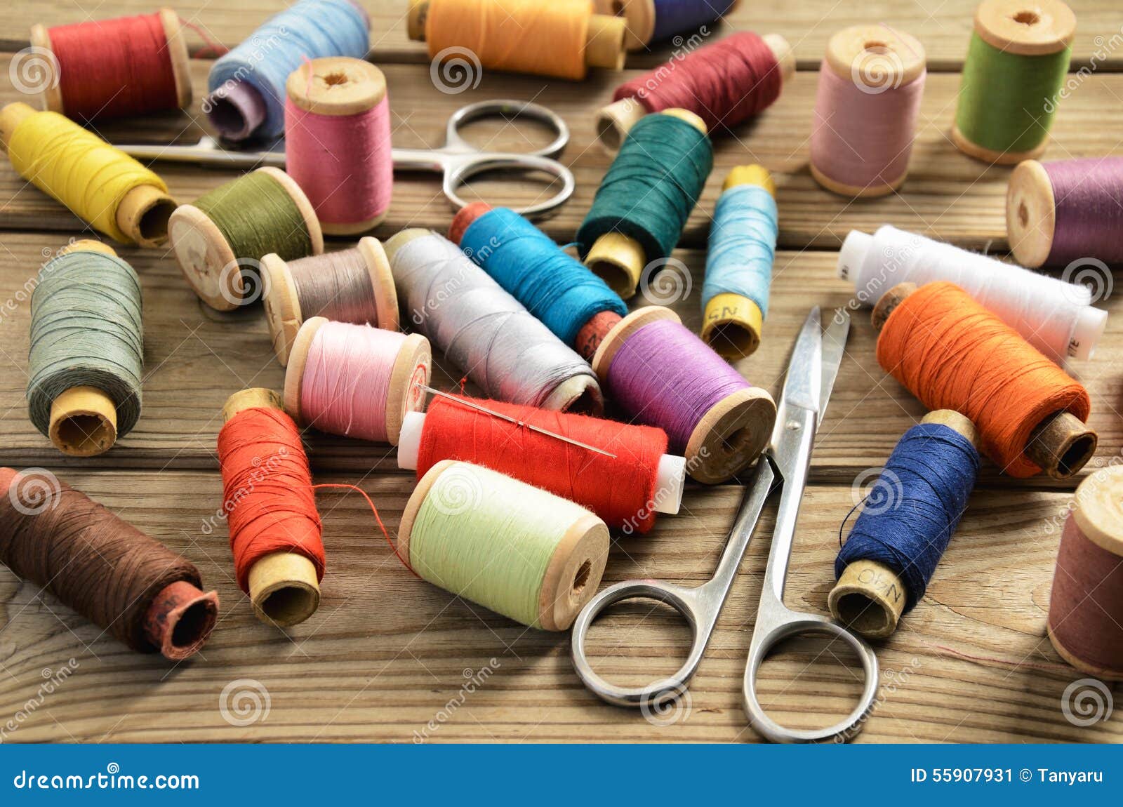 Needle Thread Scissors on a Wooden Table Stock Image - Image of measure ...