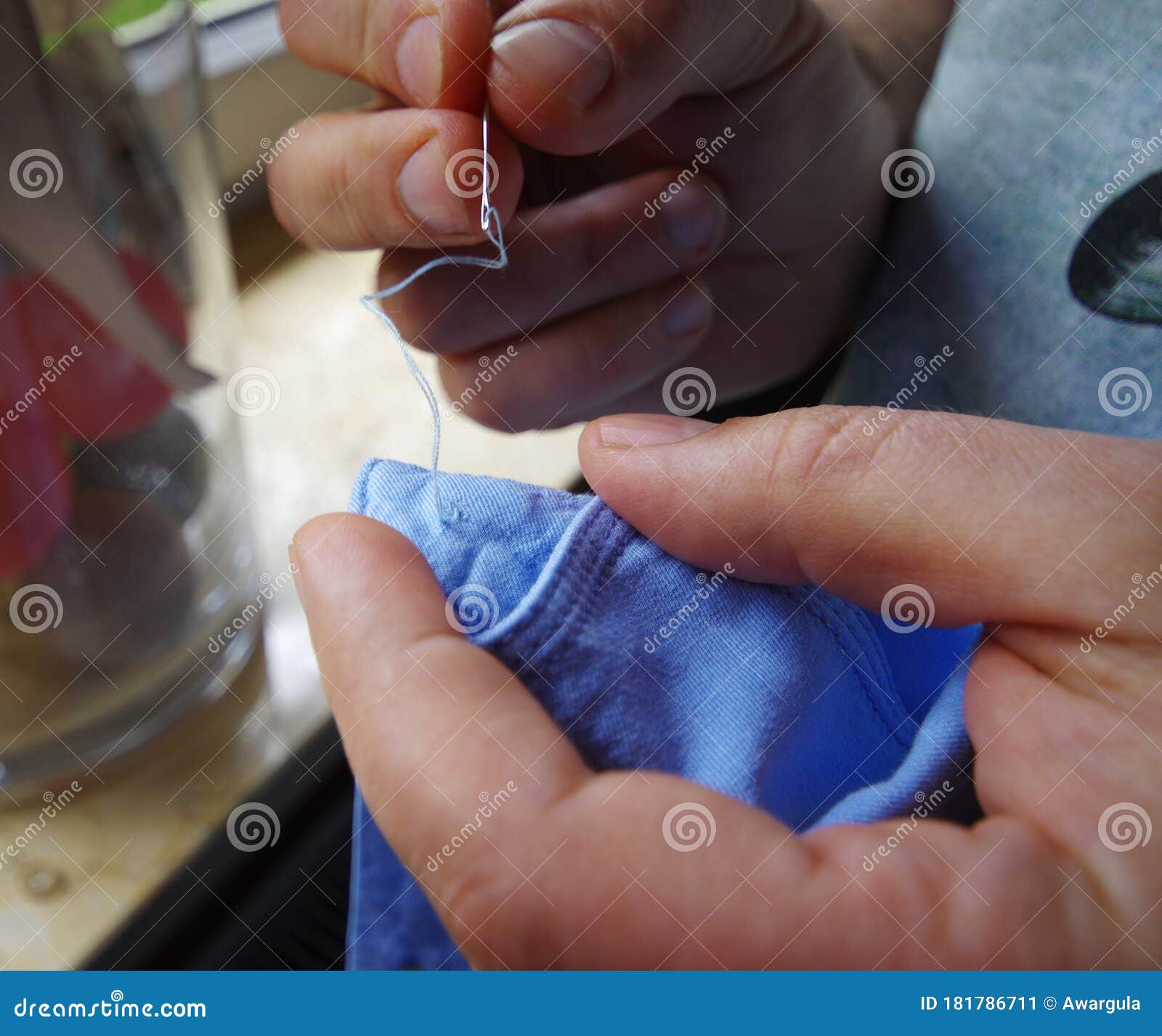 Needle and Thread in the Tailor Hand Stock Image - Image of hand ...
