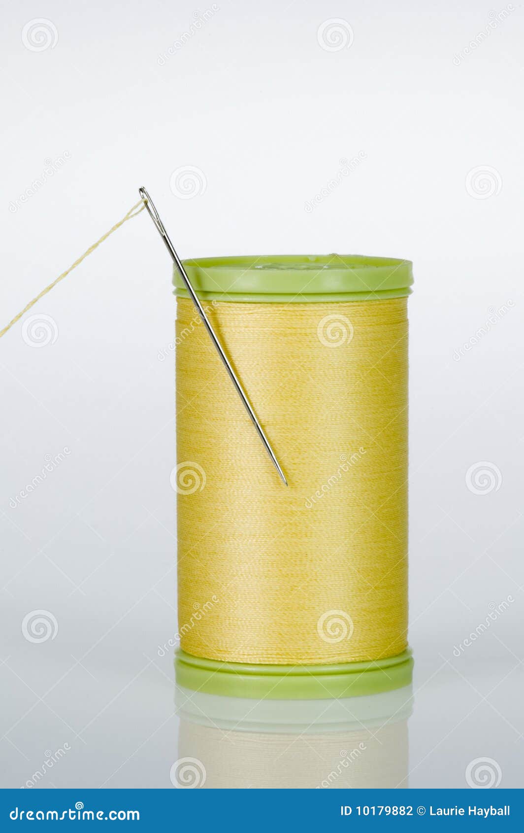 Needle and thread - Yellow stock photo. Image of repair - 10179882