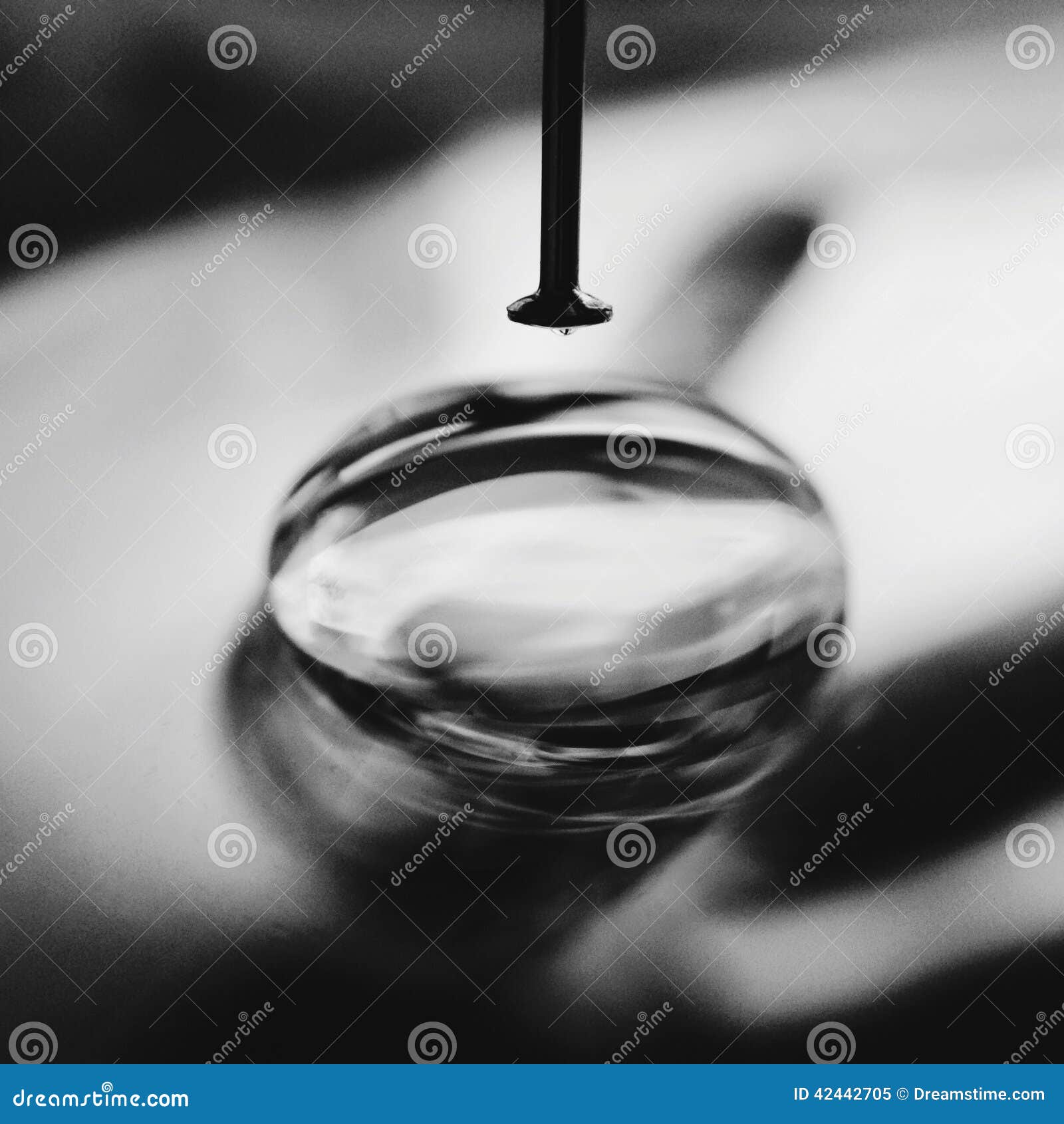 Needle in a water drop stock image. Image of shot, white - 42442705