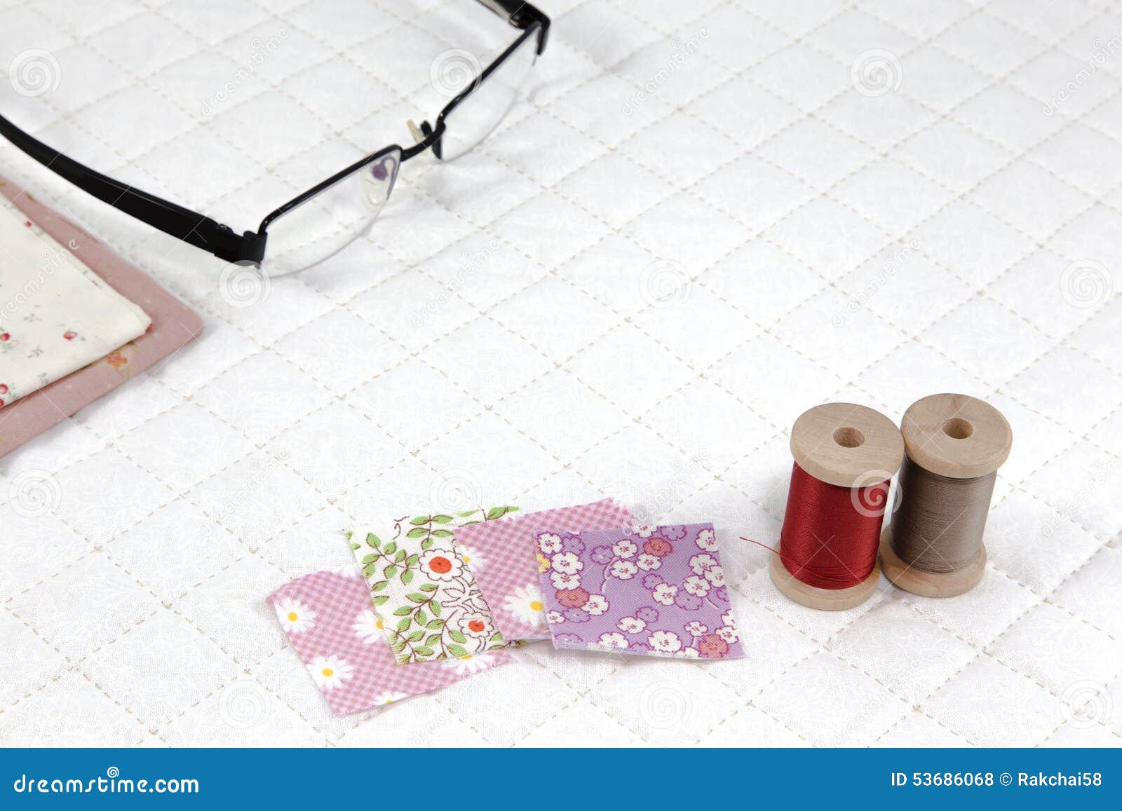 Needlework Put on White Patchwork Quilt Background Stock Photo - Image ...