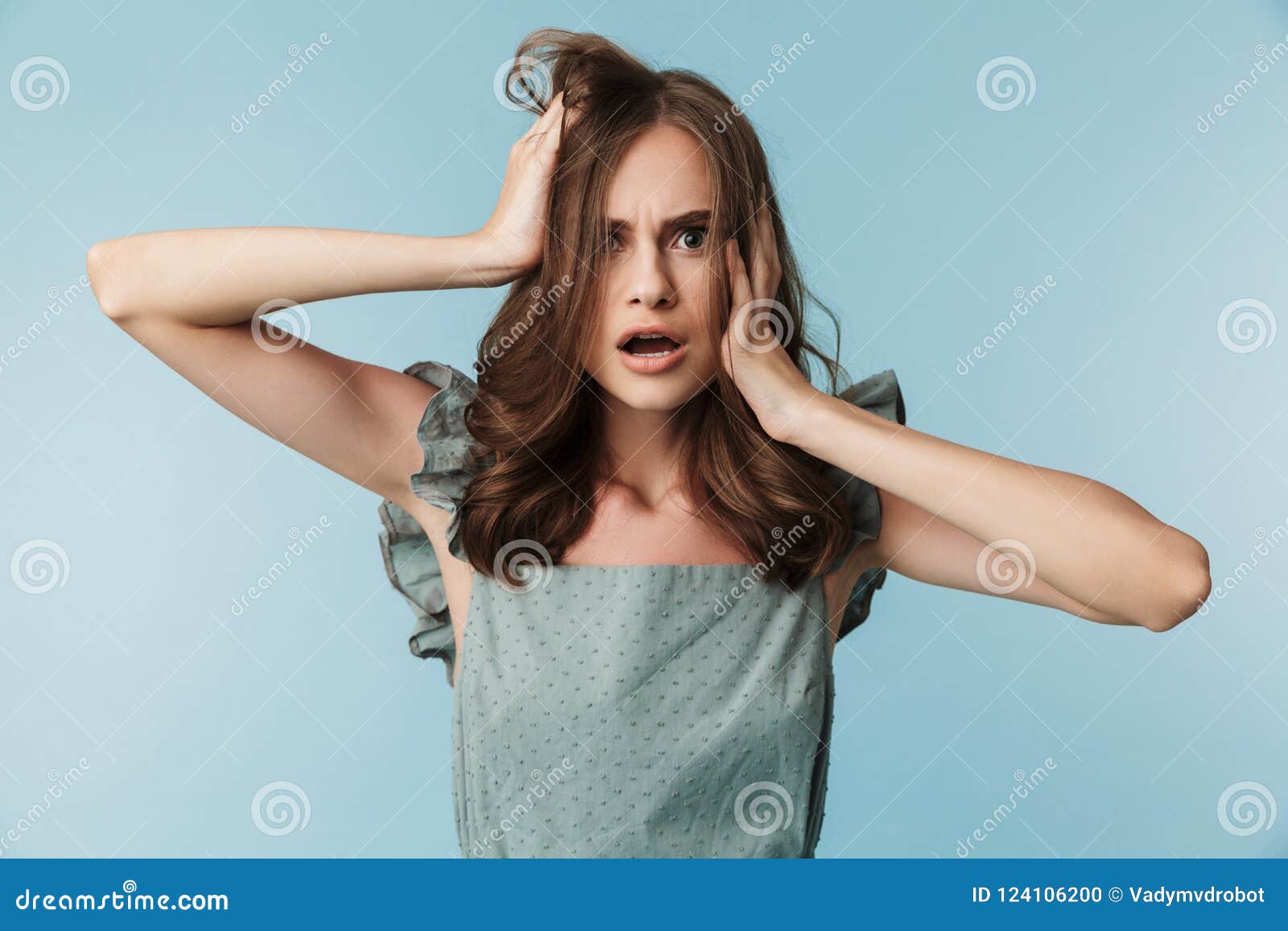 Negative Young Lady Standing Over Blue Background Looking Camera. Stock ...