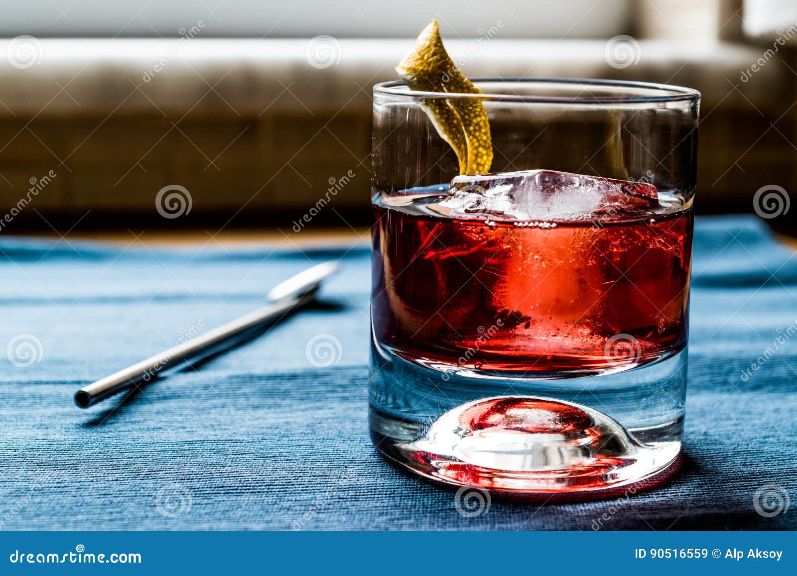 Negroni Cocktail with Lemon Peel and Ice Stock Image - Image of liquid ...