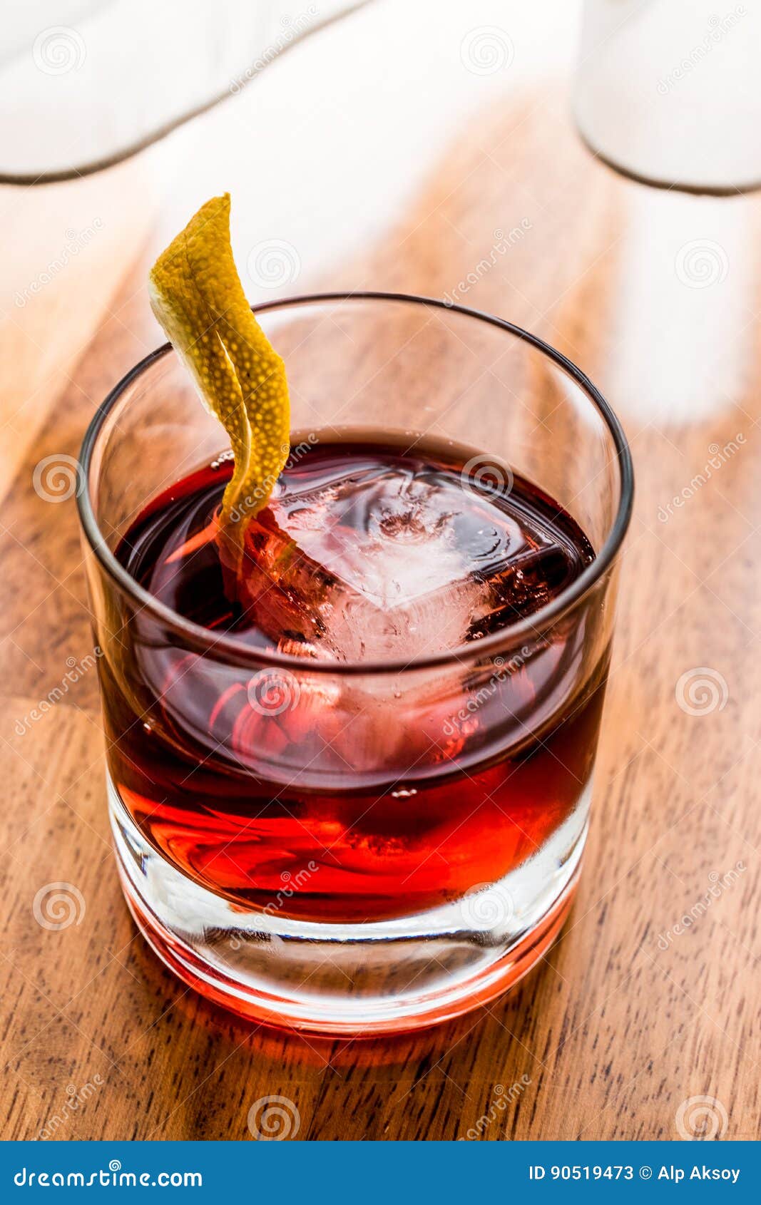 Negroni Cocktail with Lemon Peel and Ice Stock Image - Image of ...