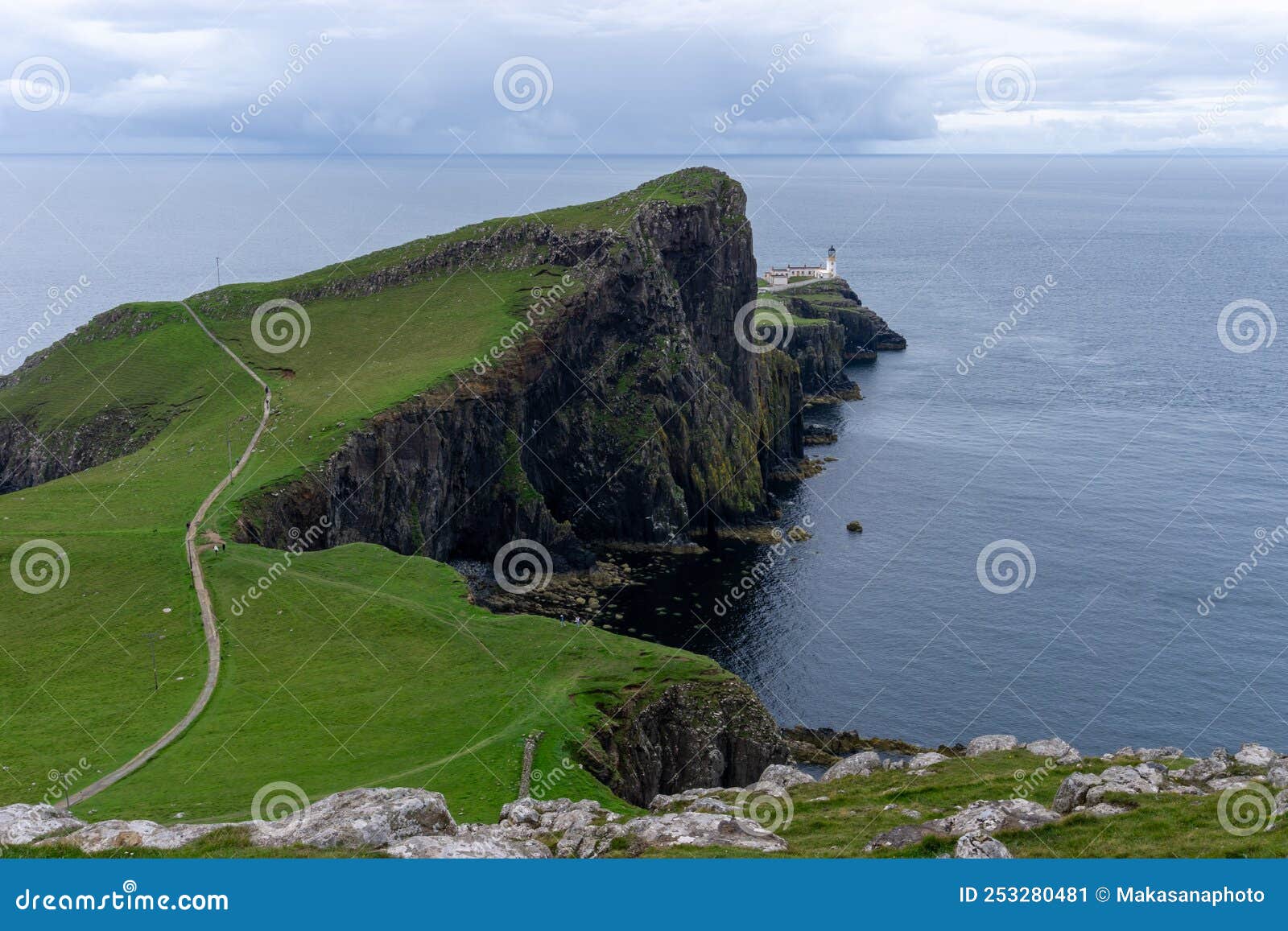 The Neist Point Lighthouse on the Green Cliffs of the Isle of Skye ...