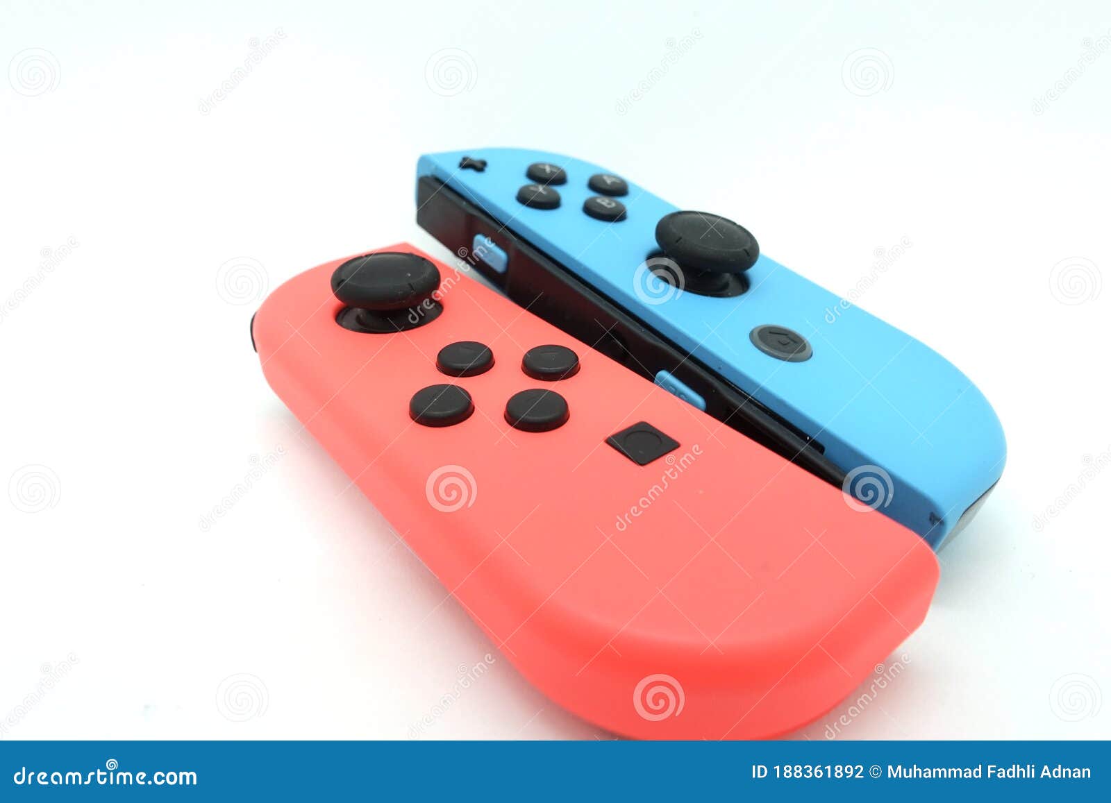 A Neon Blue and Neon Red Nintendo Switch Joycon Editorial Photography ...