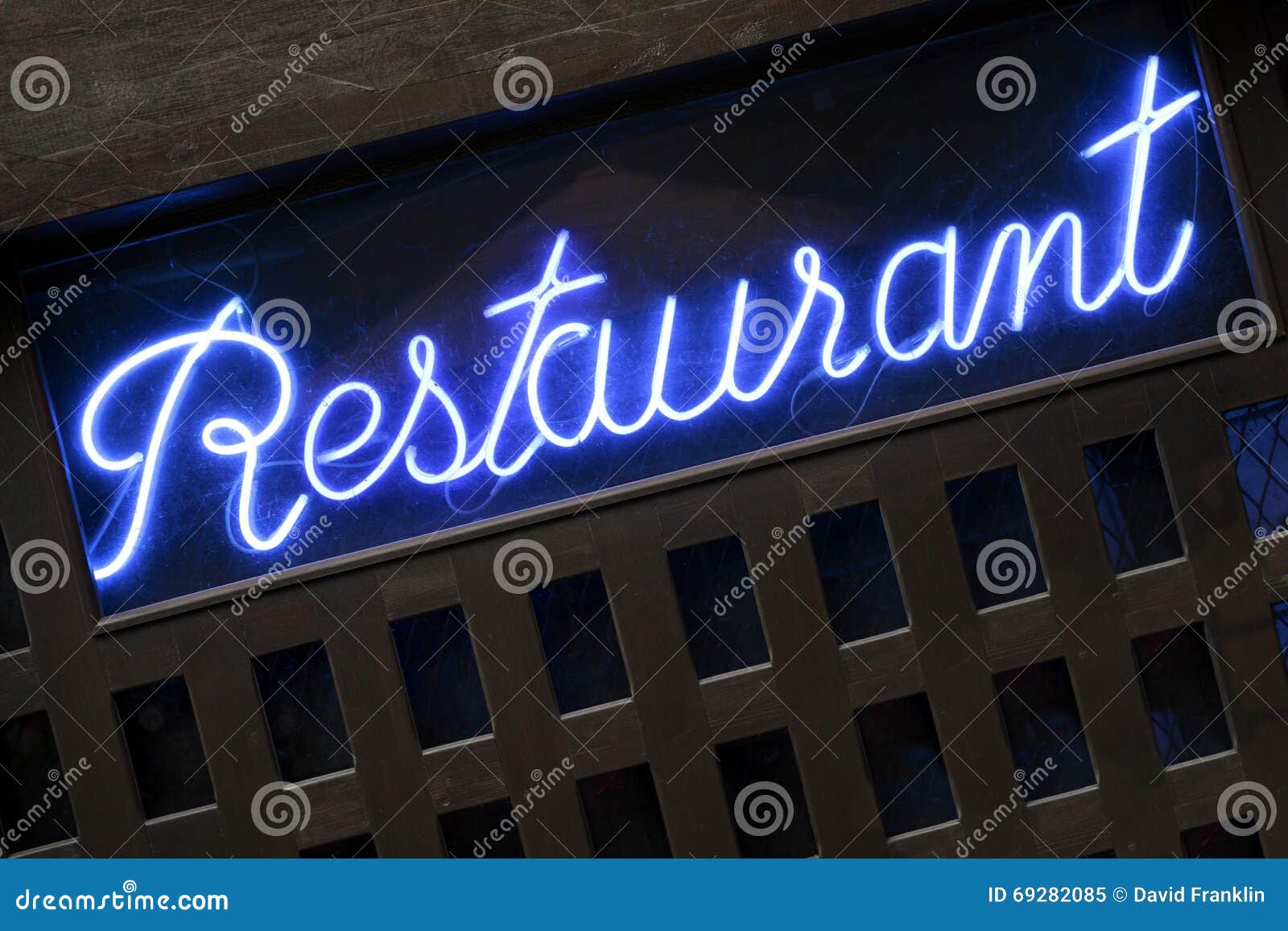 Neon Blue Restaurant Sign Lit Up at Night Closeup Stock Image - Image ...