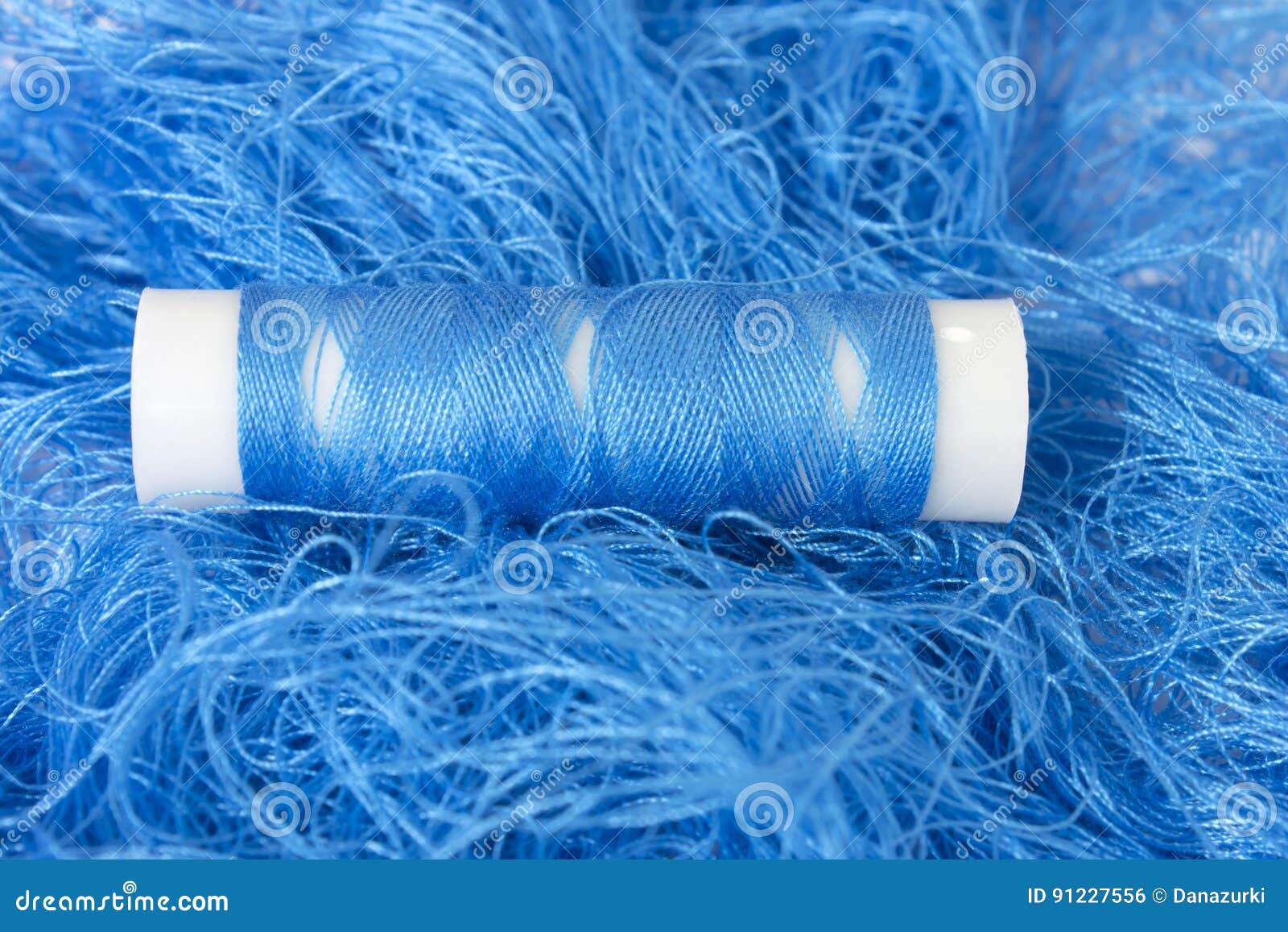 Neon Blue Sewing Thread Roll Background Stock Photo - Image of spools ...
