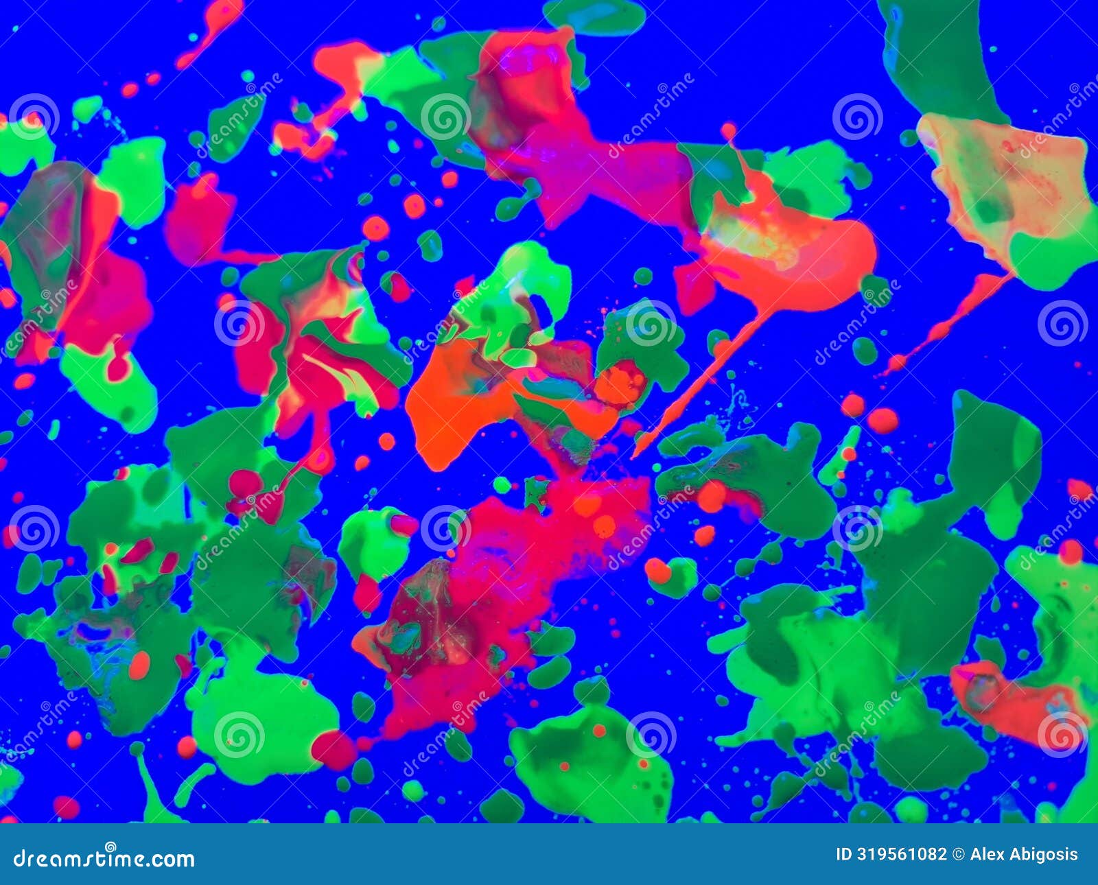 Neon Color Paint Splatter Under a Black Light Glowing Stock Photo ...