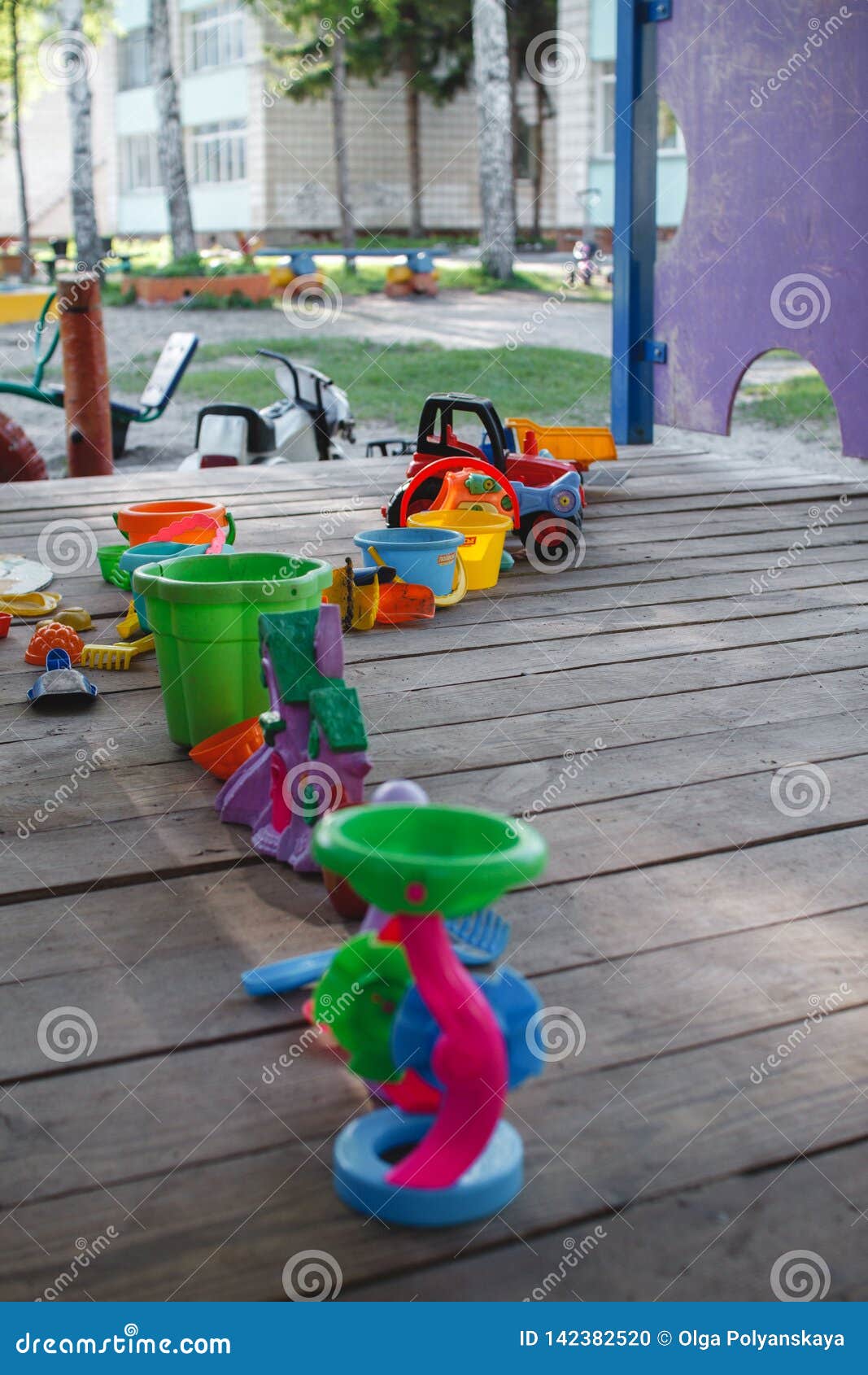 Neon Colored Plastic Toys in Childrens Sandbox Stock Photo - Image of ...