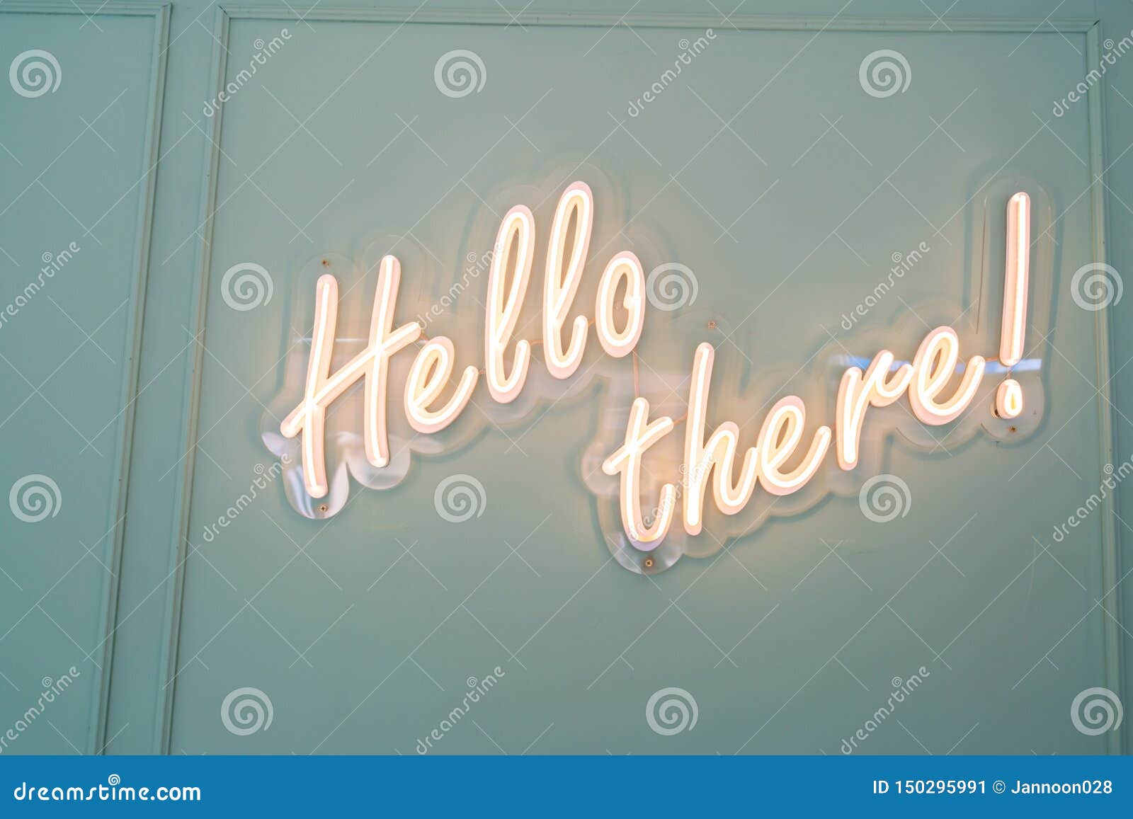 Neon Glowing Sign with Word Hello There and Green Wall Stock Image ...