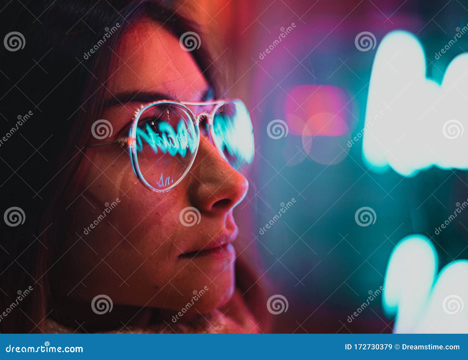 Portrait of a Girl with Neon Light Reflected on Her Glasses Stock Image ...