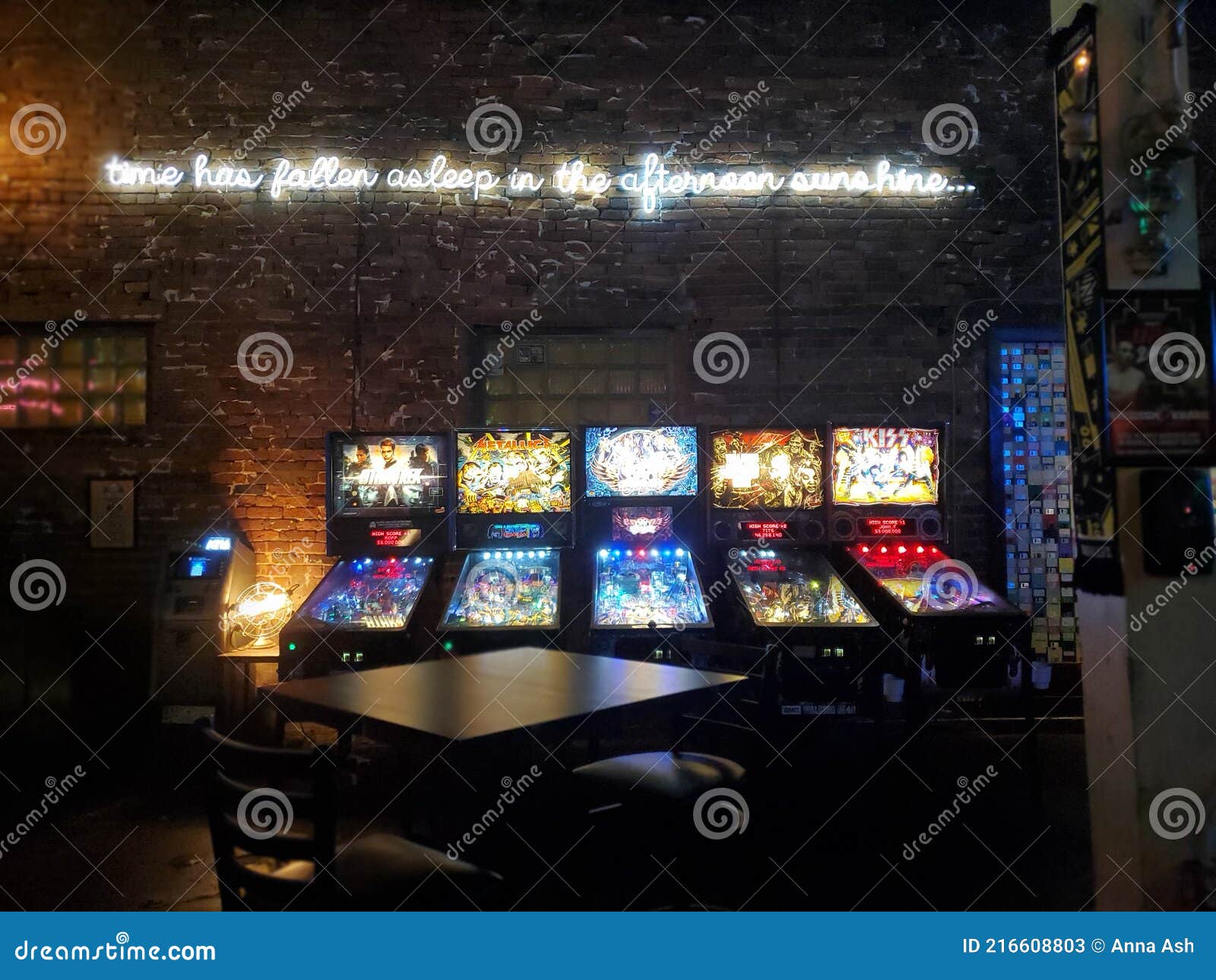 Neon lights shine at night stock image. Image of arcades - 216608803