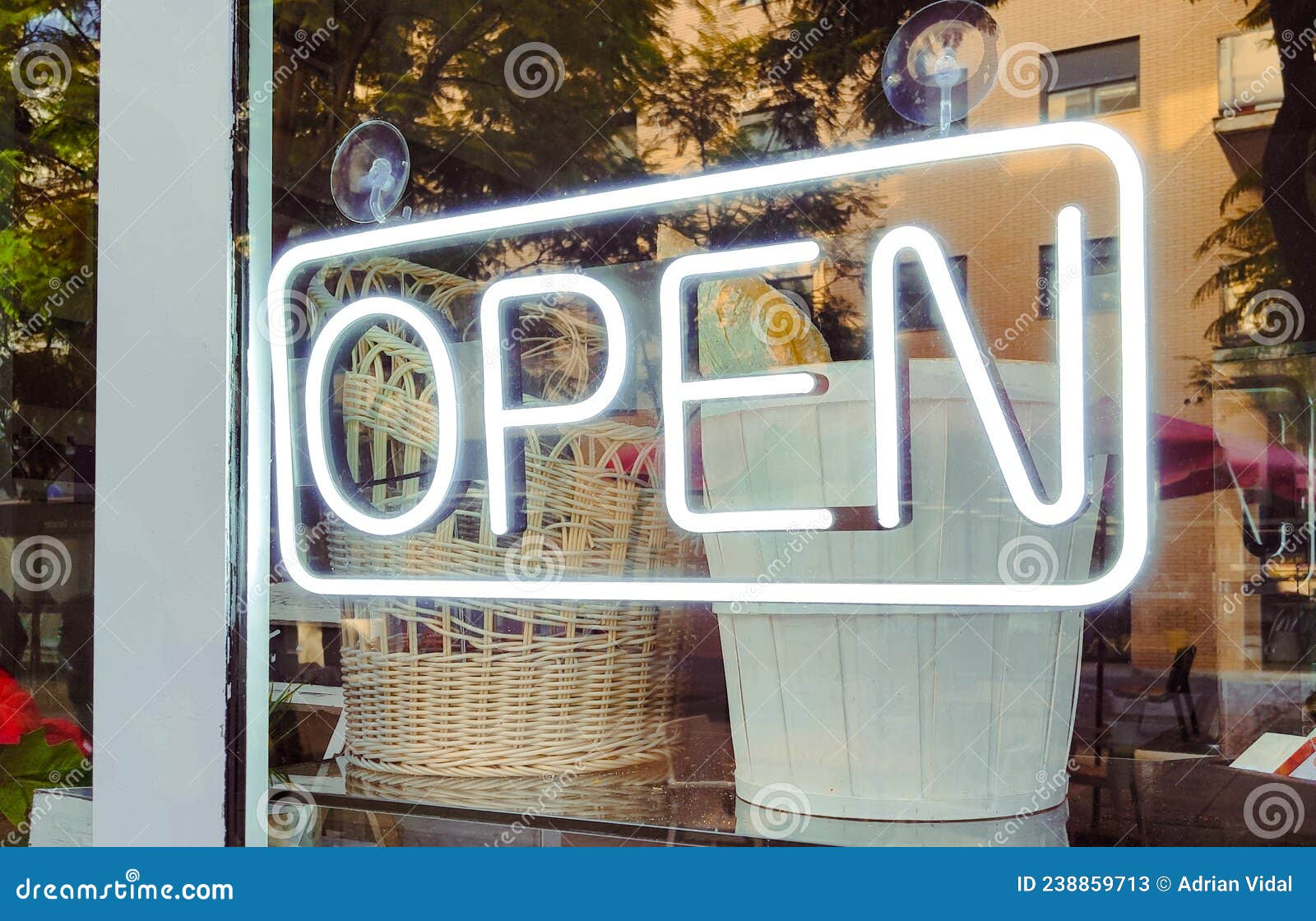 Neon Open Sign Illuminated in a Window of a Store Stock Image - Image ...