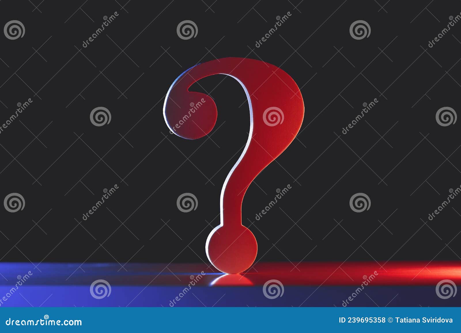 Neon Red Question Mark Symbol on a Blue Desk and Black Stock Photo ...