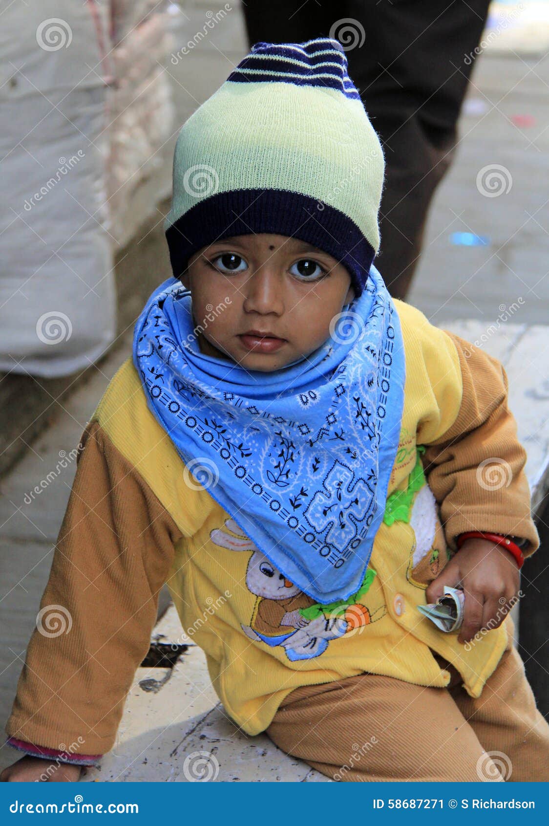 Child Clutching Her Head Among The Hovering Butterflies. Royalty-Free ...