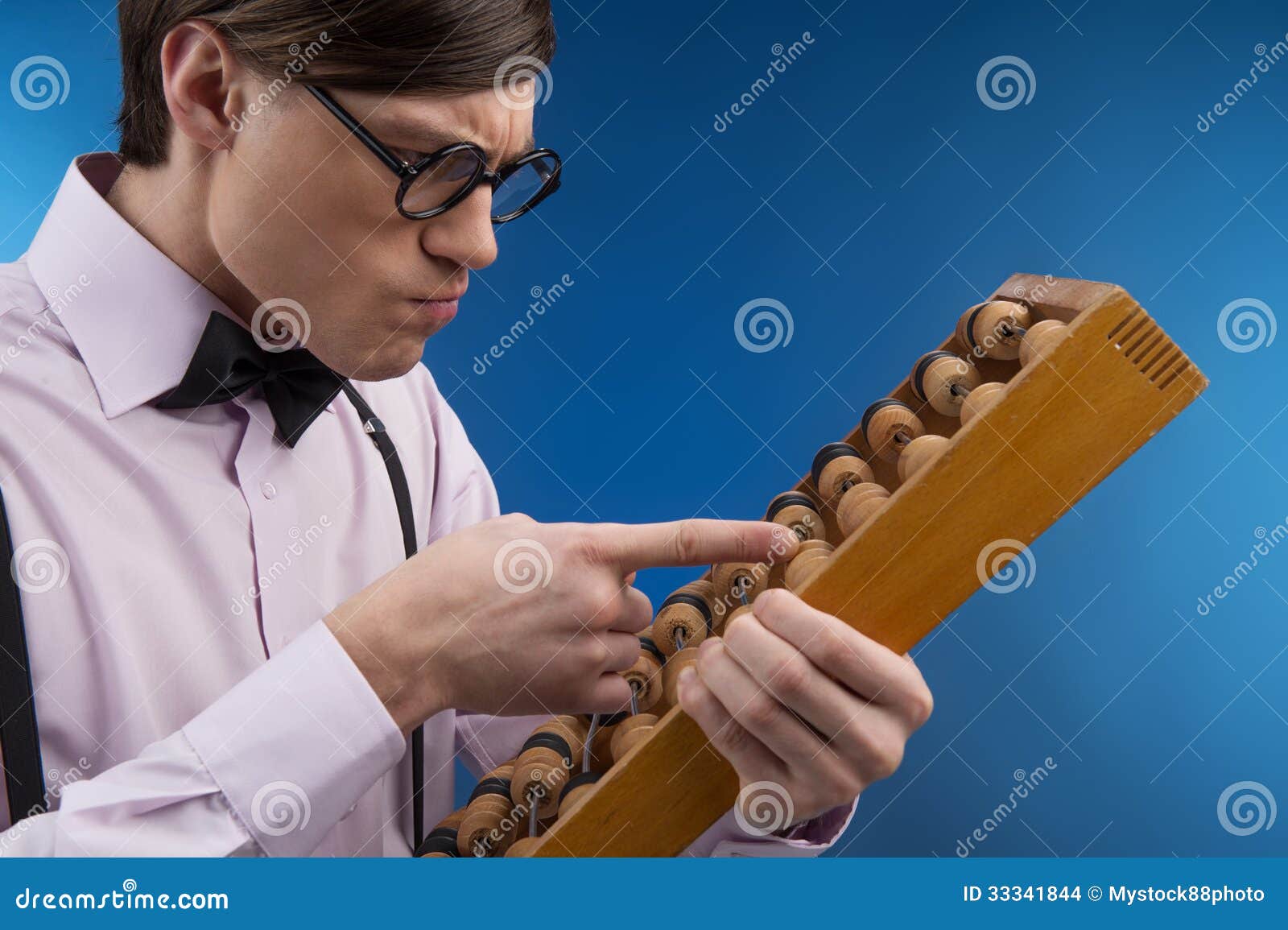Nerd with Abacus. Side View of Young Nerd Man Holding Abacus and Stock ...