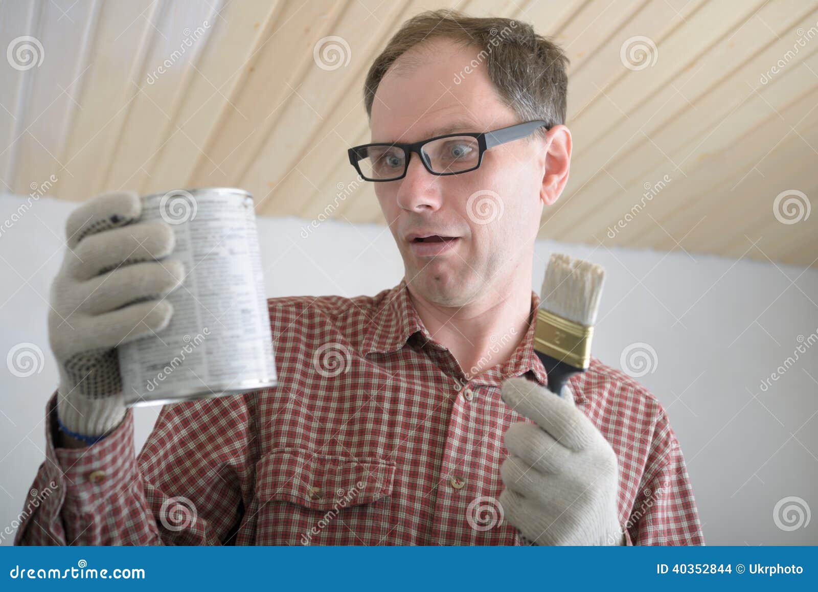 Nerd with a can of paint stock photo. Image of brush - 40352844