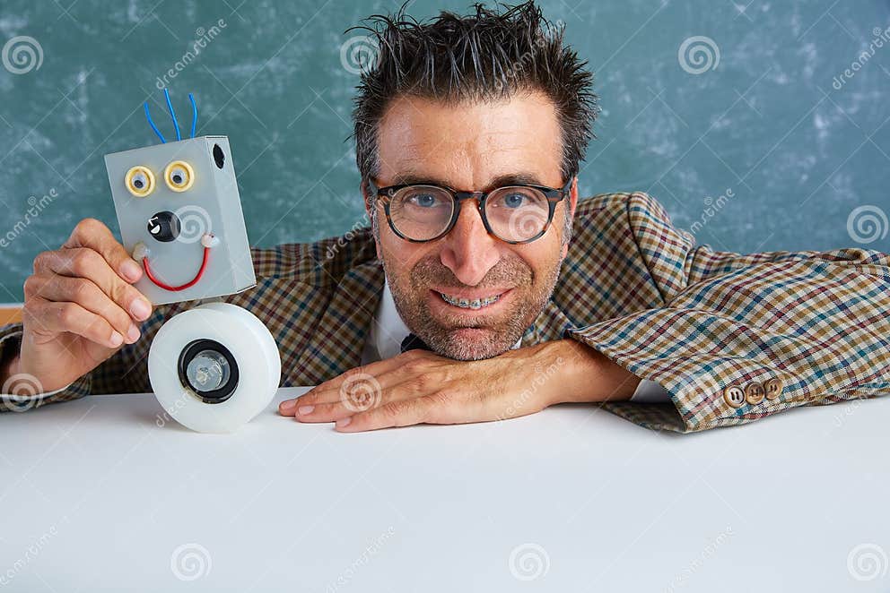 Nerd Electronics Technician with Self Made Robot Stock Photo - Image of ...
