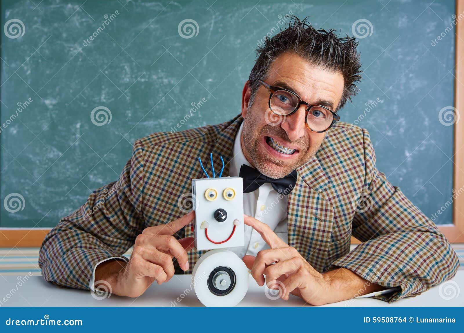 Nerd Electronics Technician with Self Made Robot Stock Photo - Image of ...