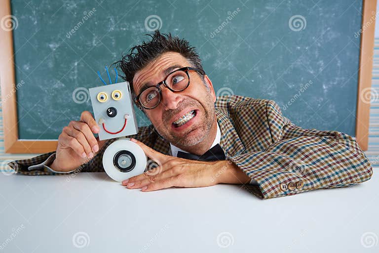 Nerd Electronics Technician with Self Made Robot Stock Image - Image of ...